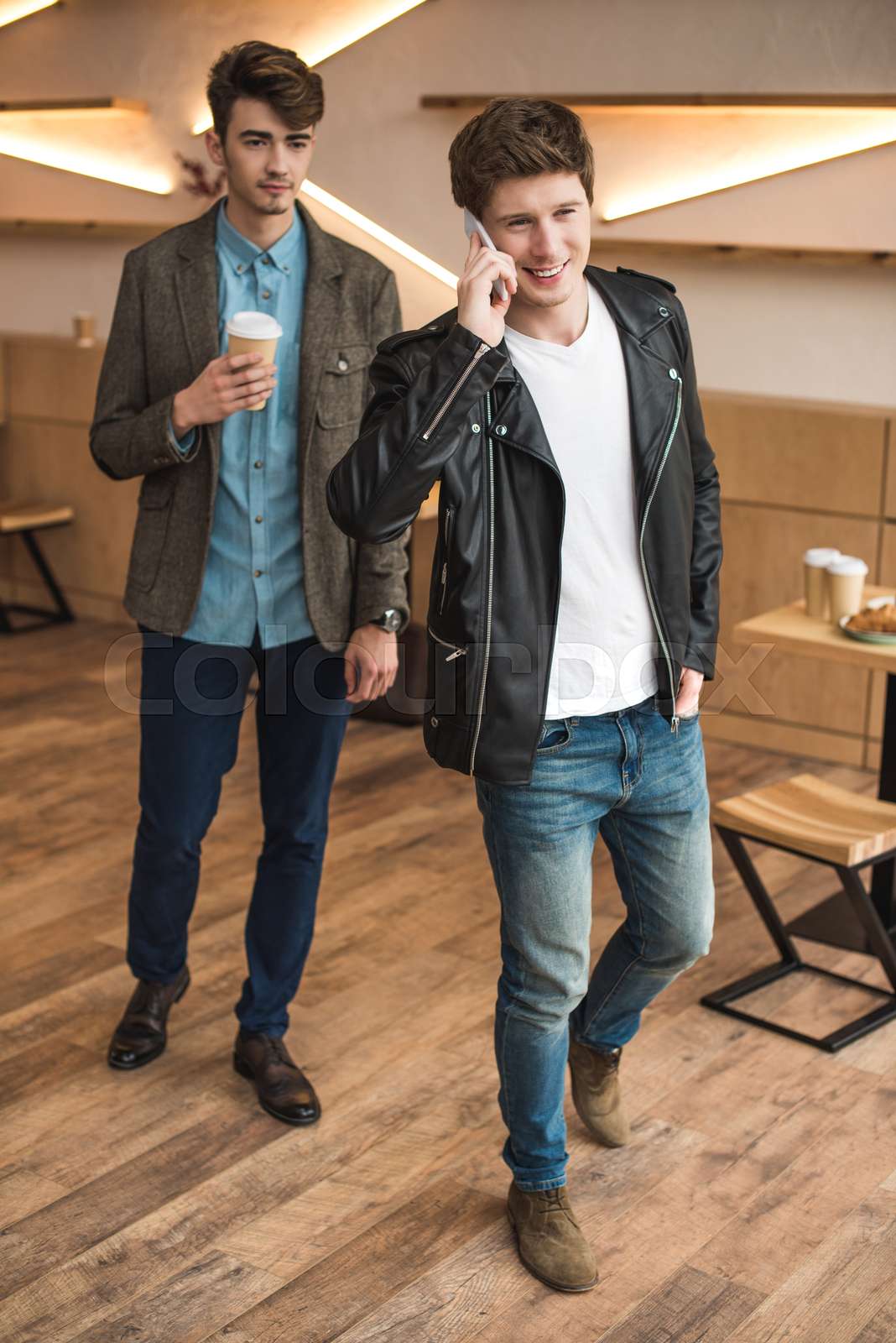 men leaving cafe | Stock image | Colourbox