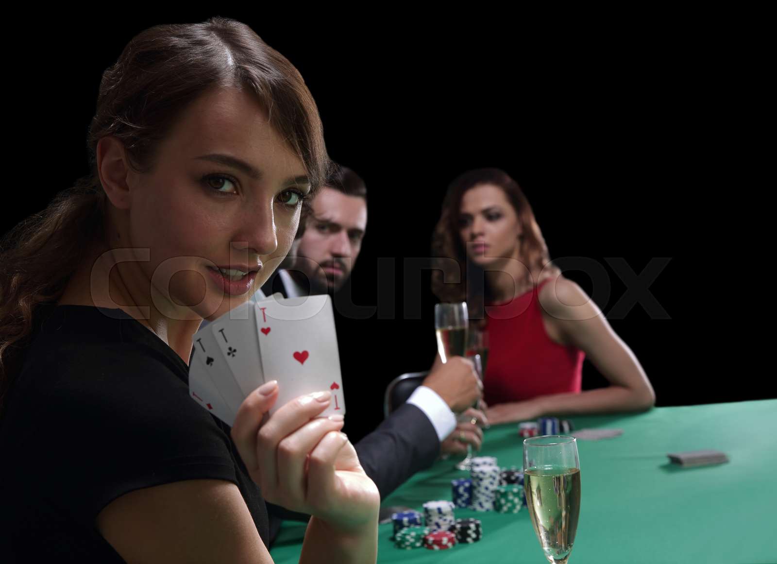 Portrait of the female gambler at the poker table with cards | Stock ...