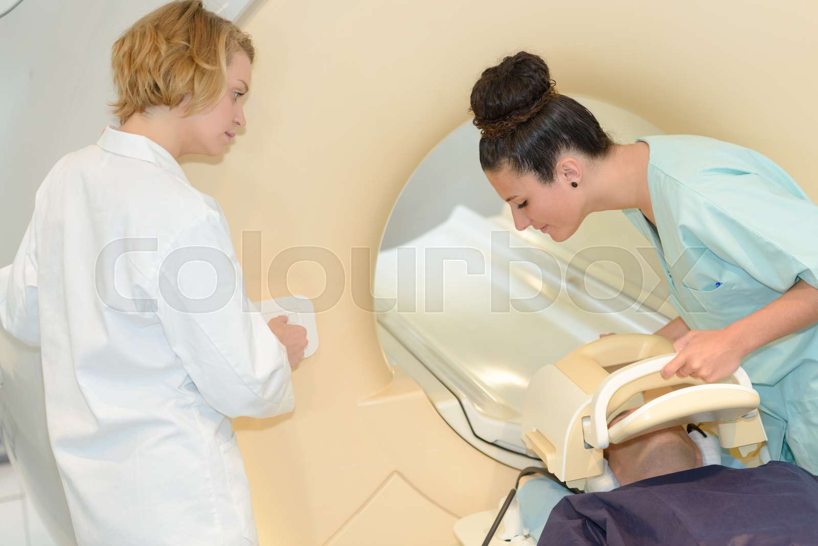 patient undergoing ct scan test in examination room | Stock image ...