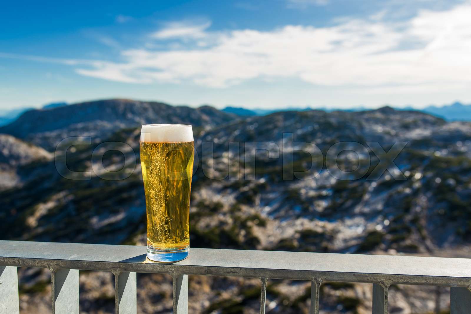 A glass of fresh beer on mountains | Stock image | Colourbox