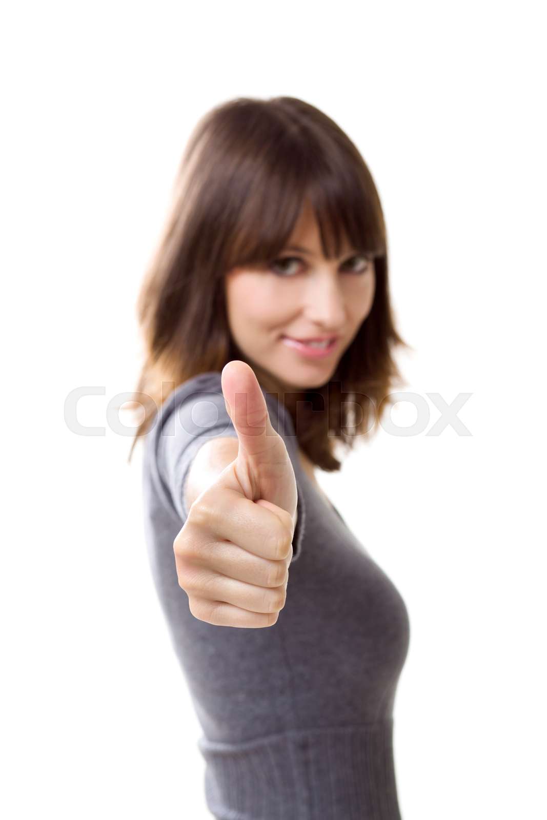 Woman doing thumbs up | Stock image | Colourbox