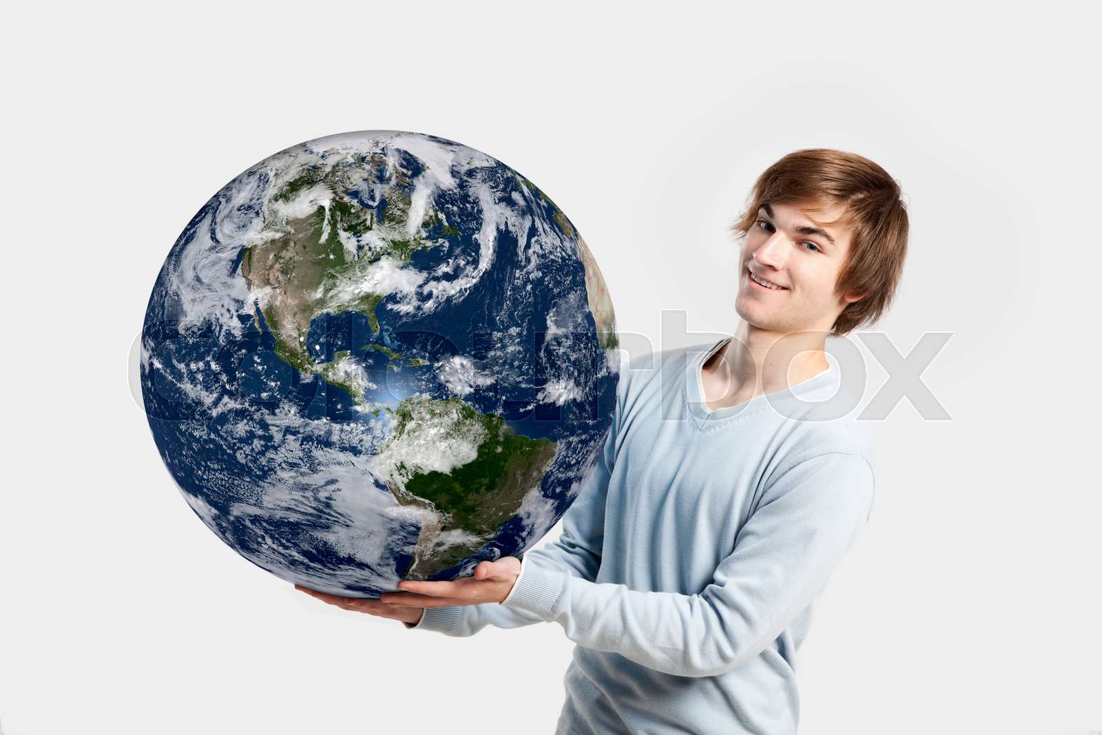 Holding my world | Stock image | Colourbox