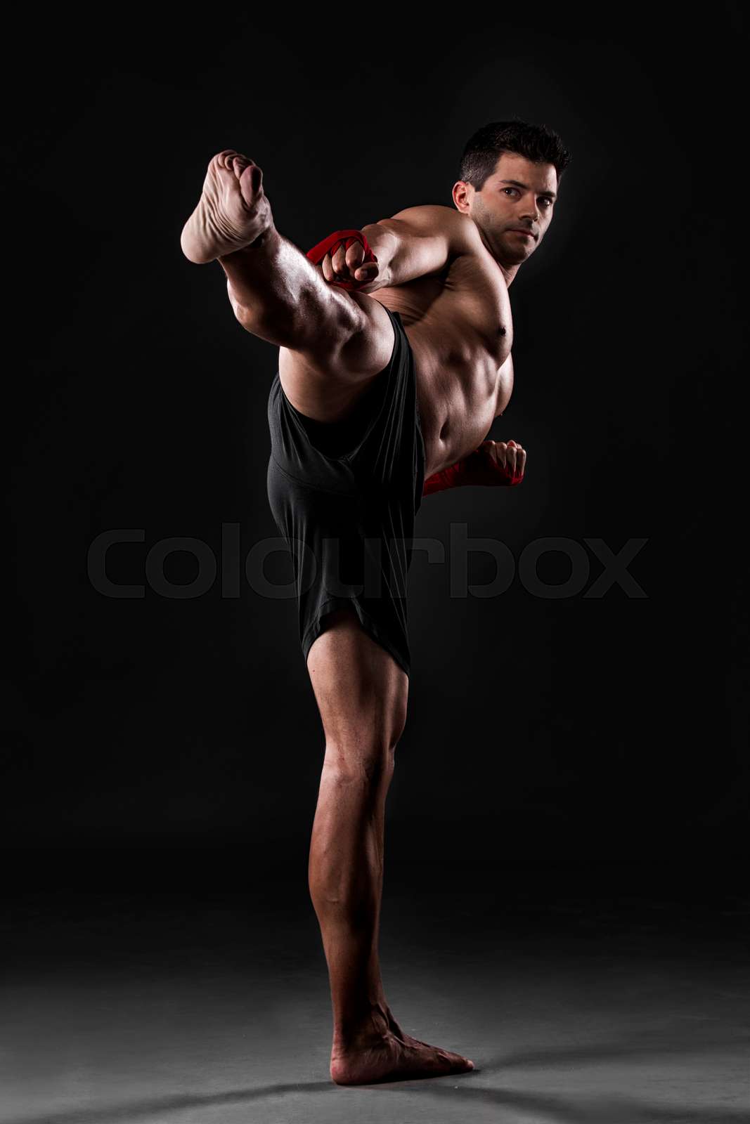 Man practicing body combat | Stock image | Colourbox