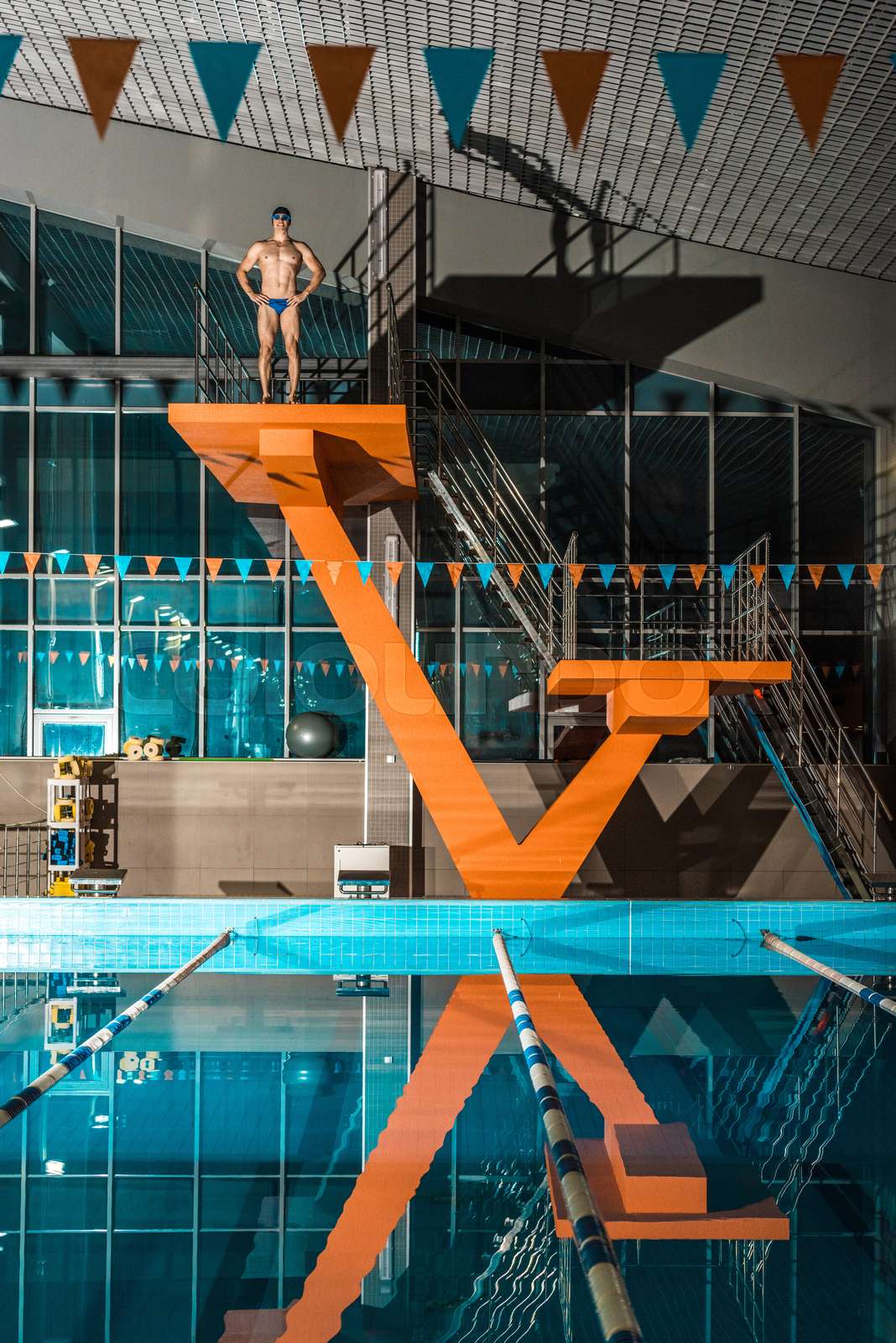 swimmer standing on diving platform | Stock image | Colourbox