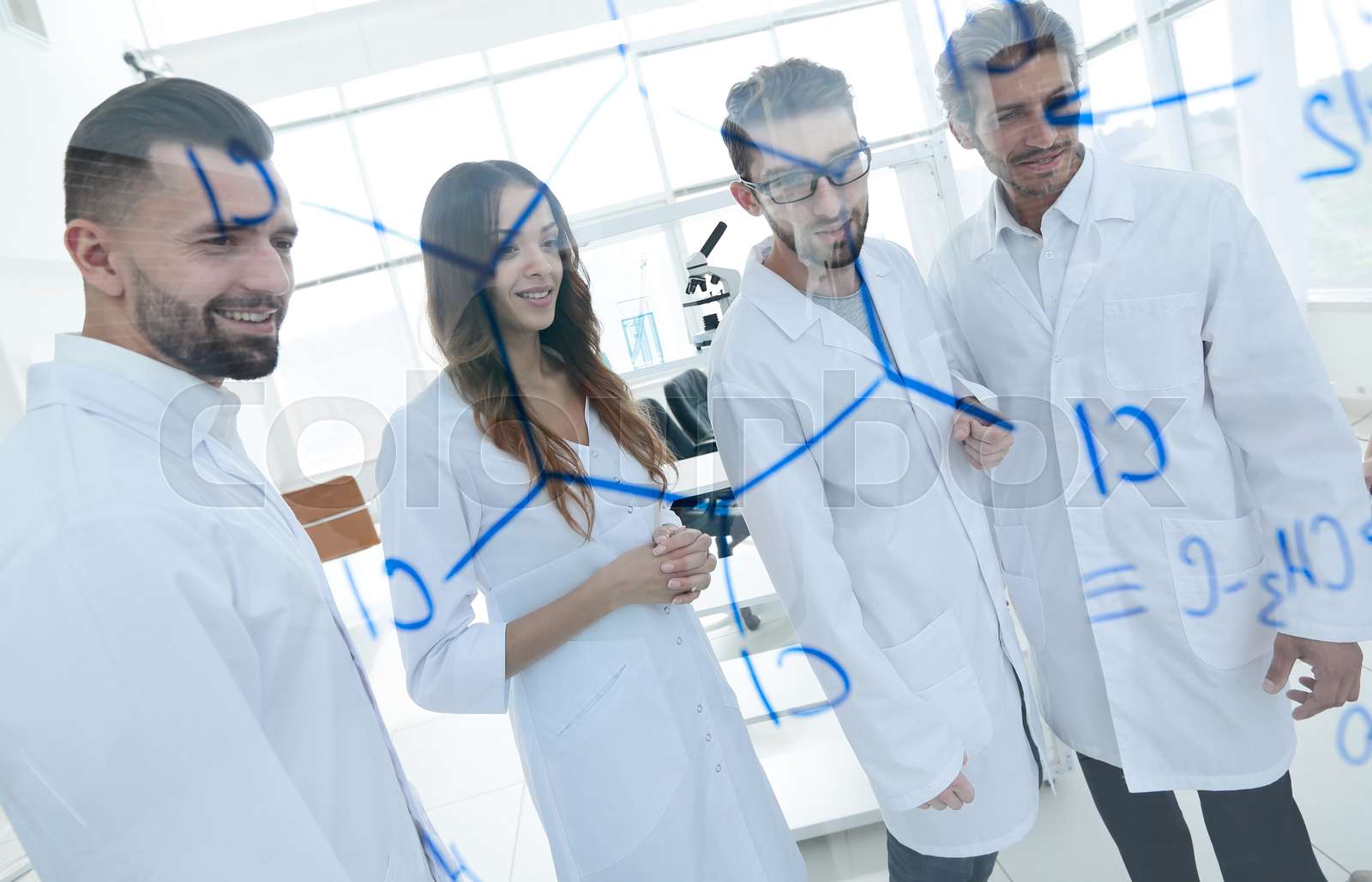 group of laboratory employees. | Stock image | Colourbox