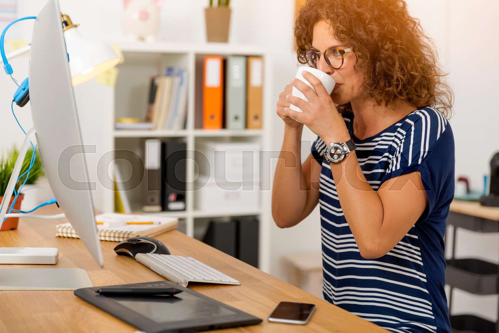 Coffee break at work | Stock image | Colourbox