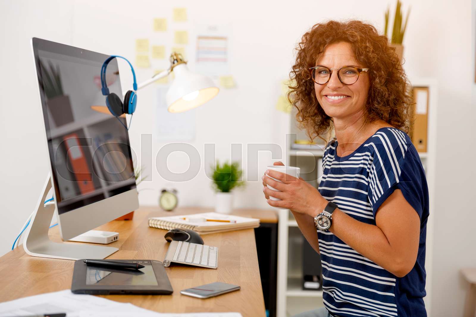 Coffee break at work | Stock image | Colourbox