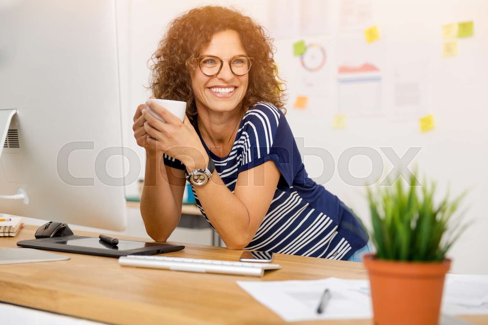 Coffee break at work | Stock image | Colourbox
