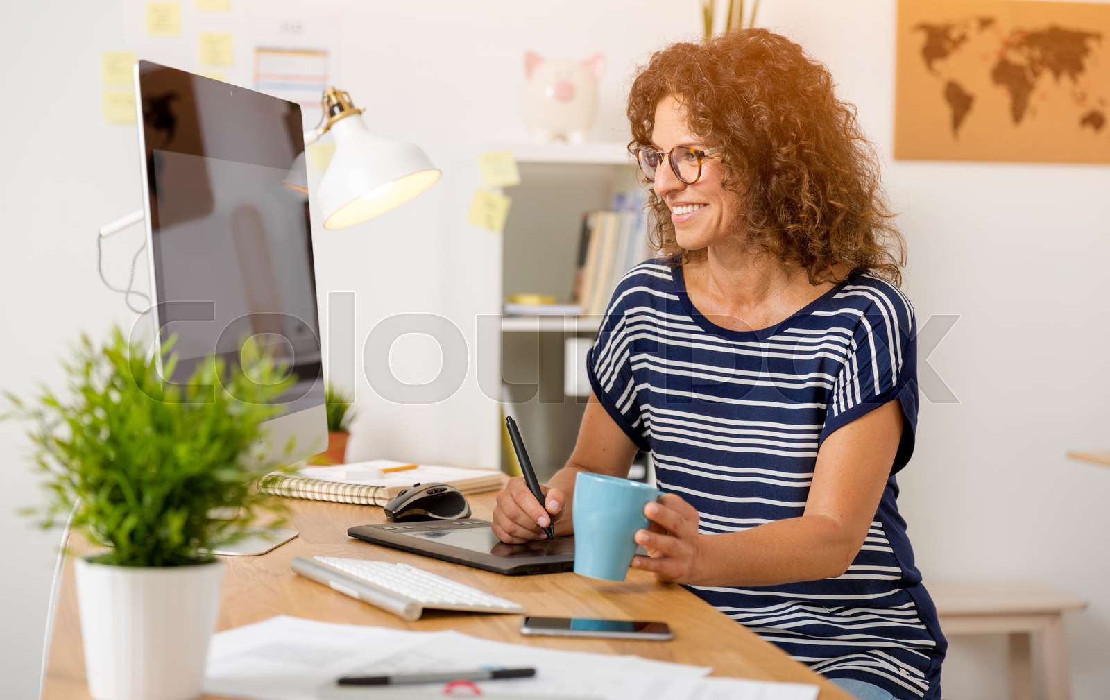 Doing some design work | Stock image | Colourbox