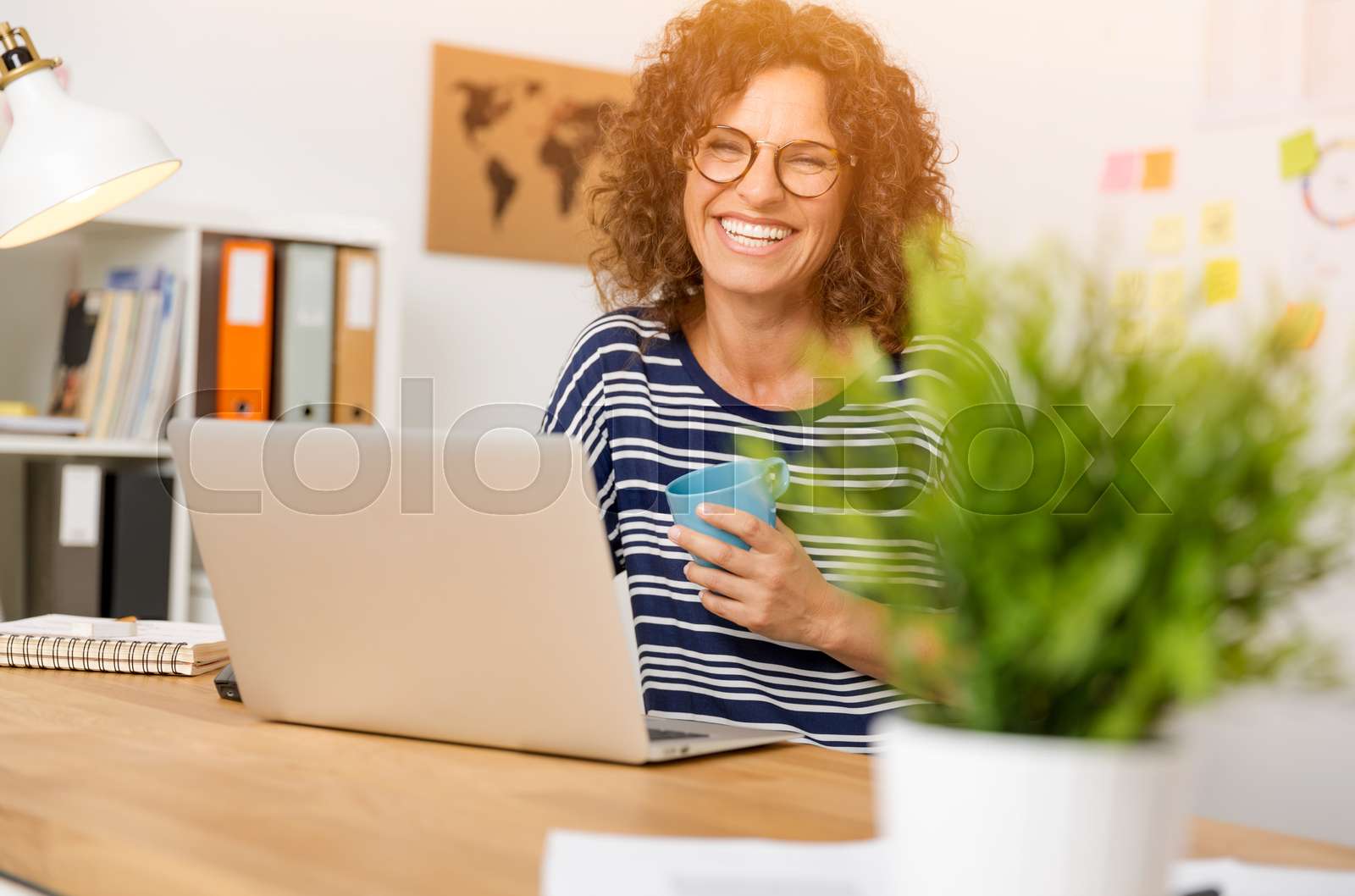 Coffee break at work | Stock image | Colourbox
