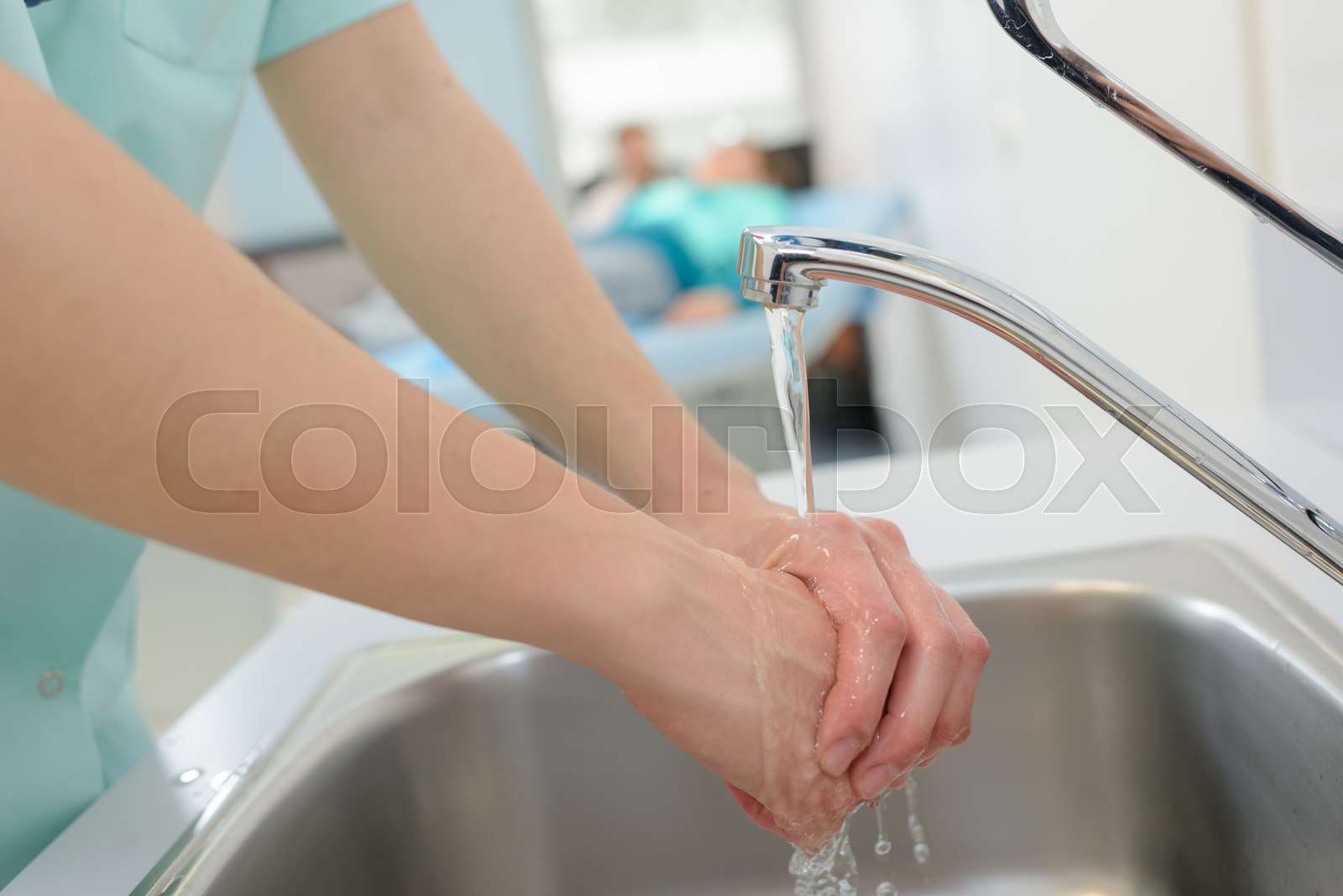 nurse washes hands | Stock image | Colourbox