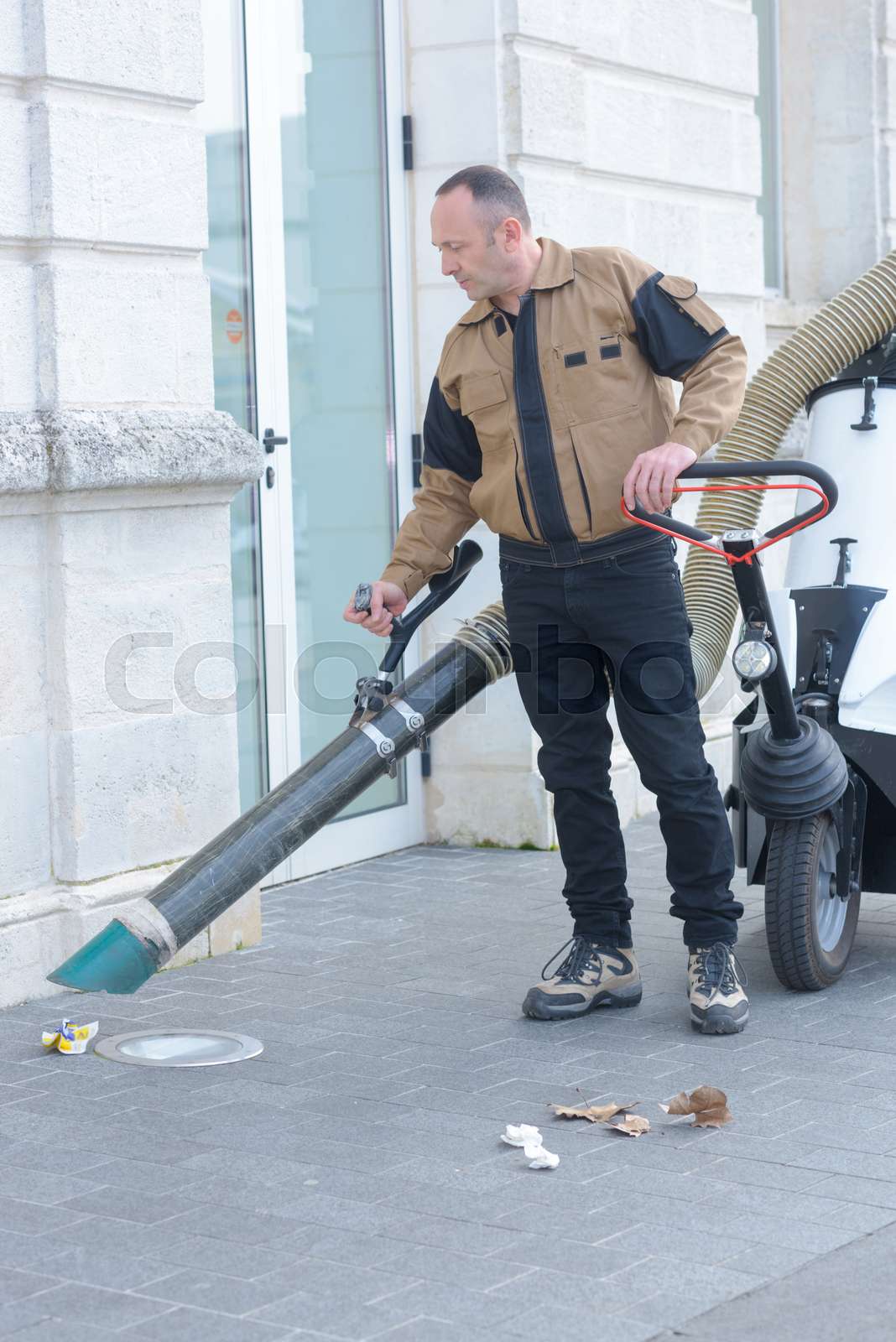 throwing garbage on the street | Stock image | Colourbox