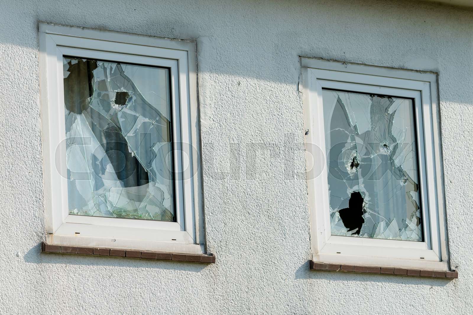 Broken Glass House Window