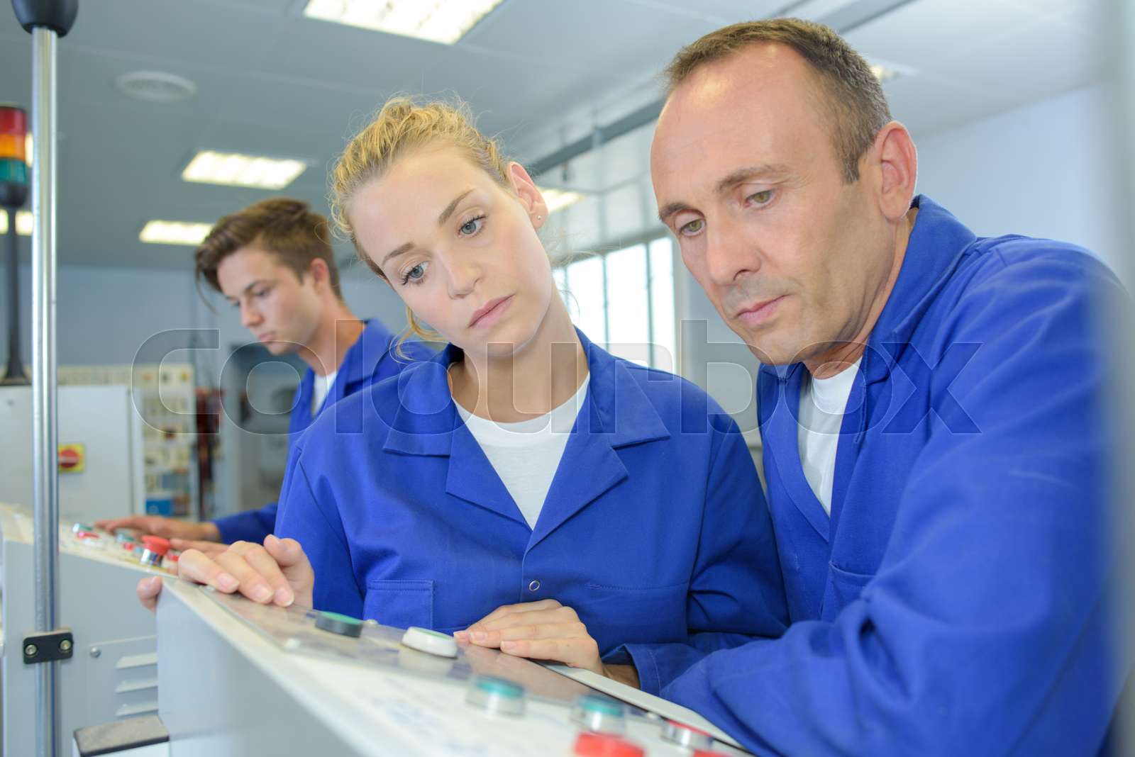 working with machine | Stock image | Colourbox