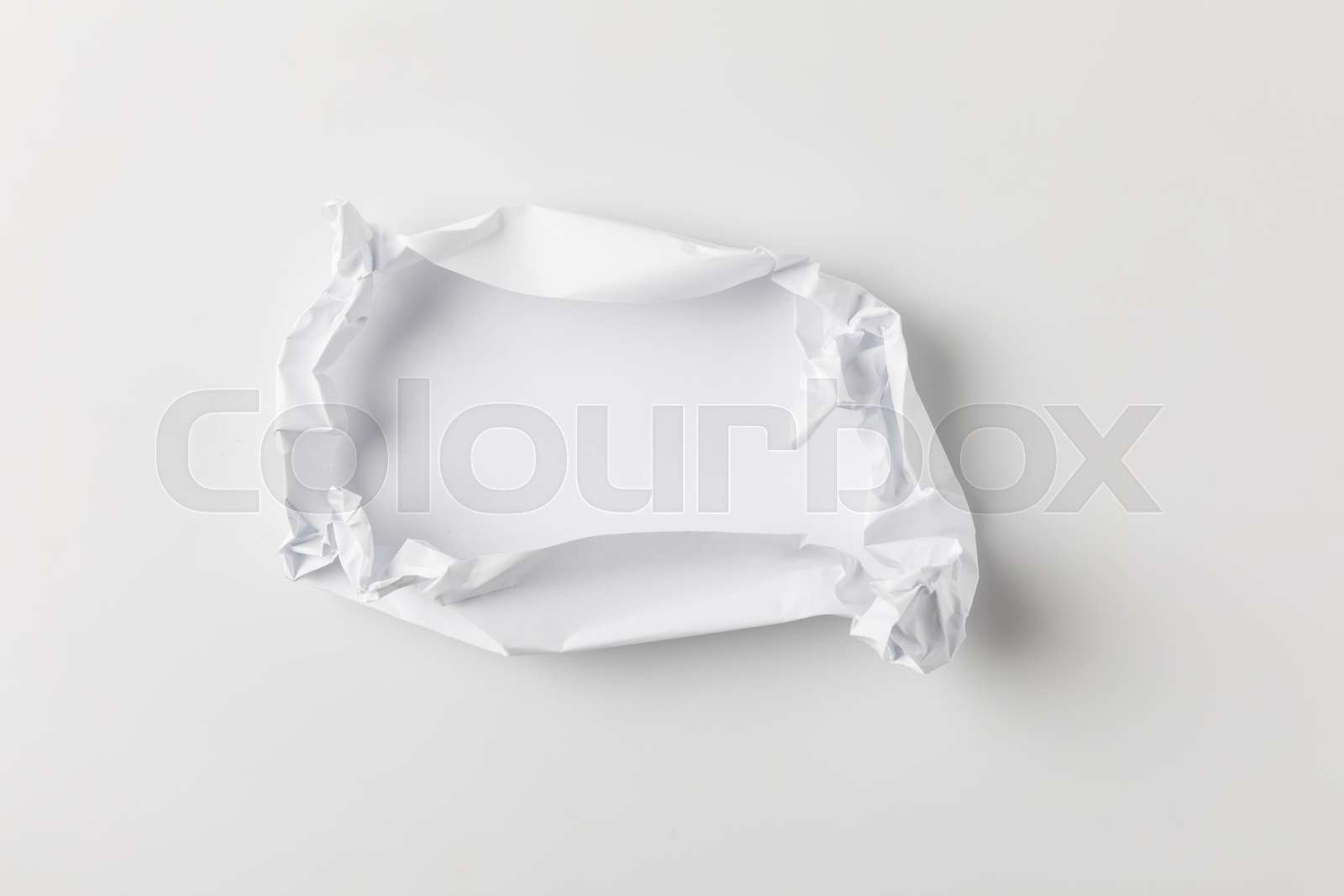crumpling blank paper | Stock image | Colourbox