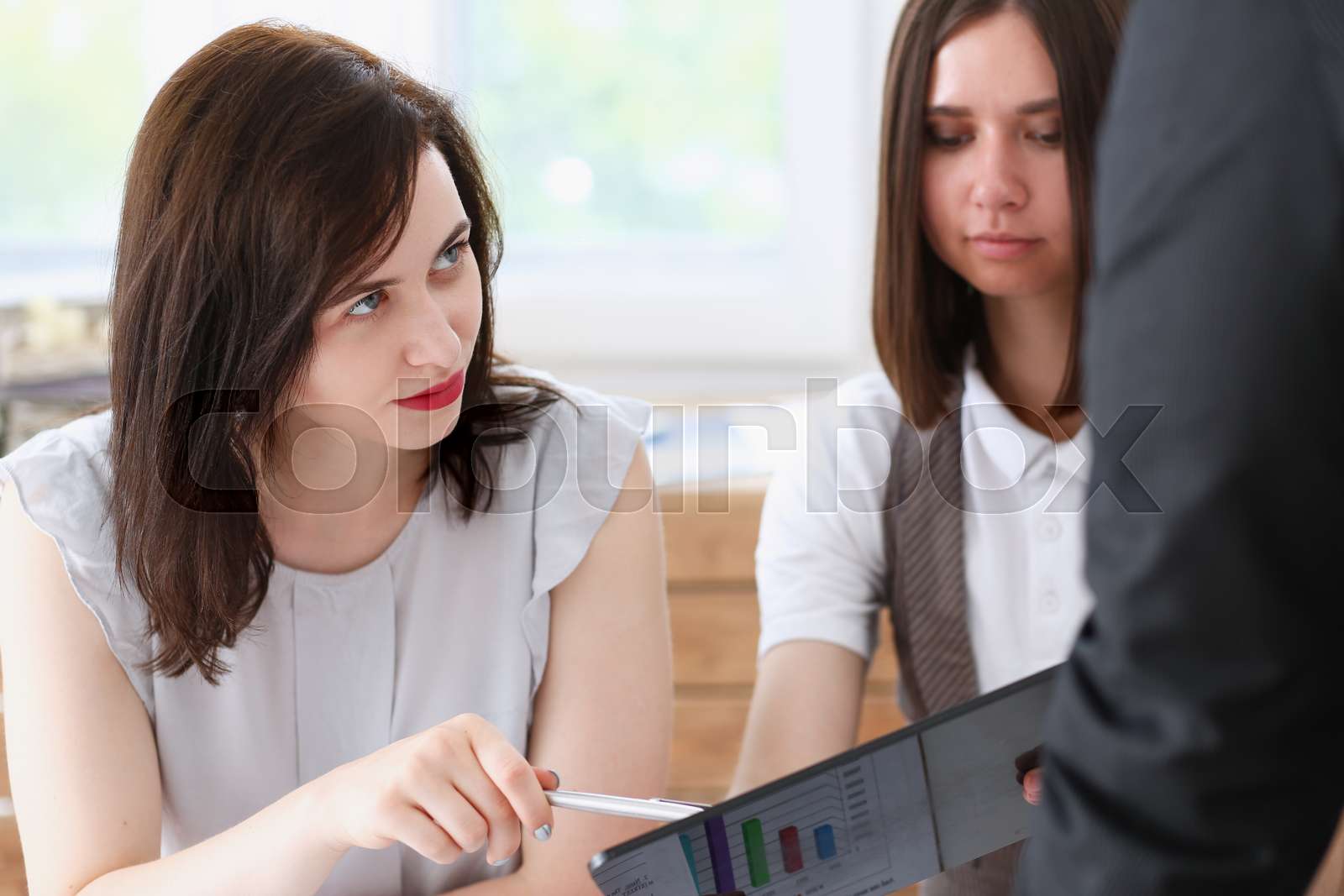 Group of people deliberate on problem with | Stock image | Colourbox