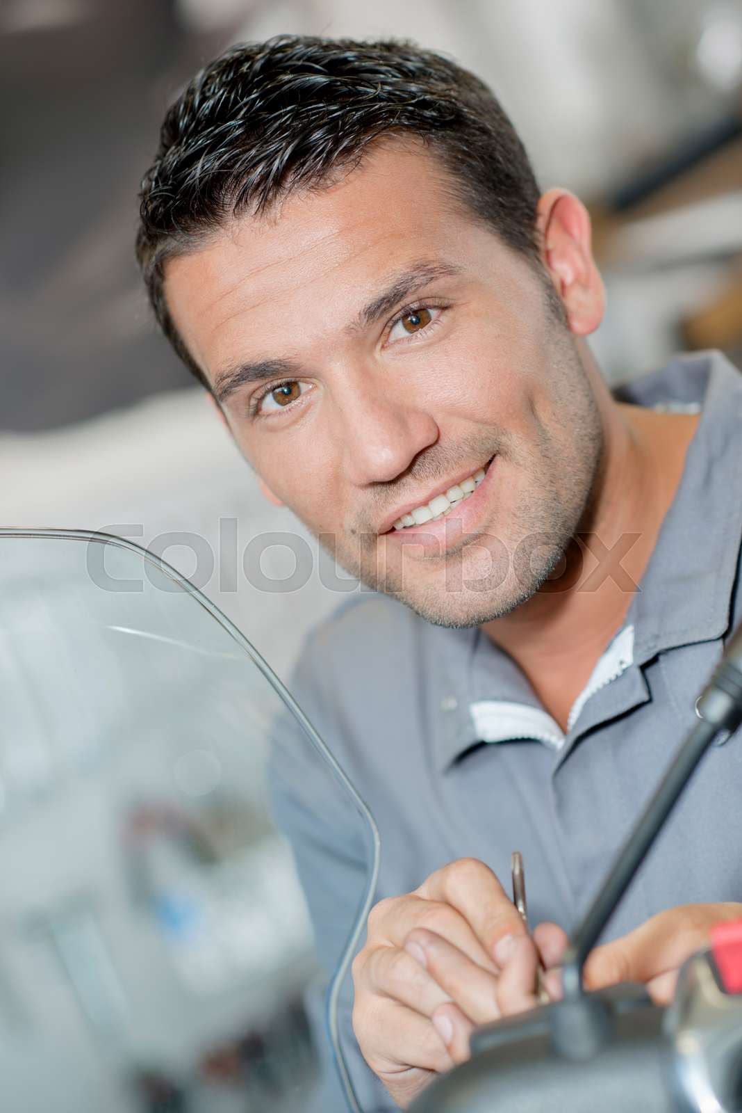 Smiling workman | Stock image | Colourbox