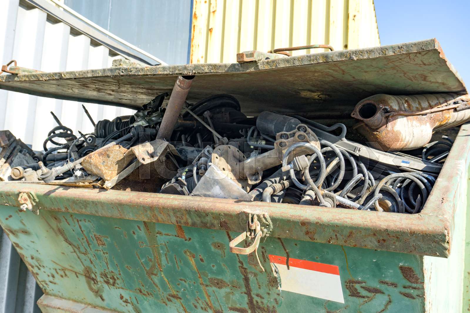 Scrap metal in the container | Stock image | Colourbox