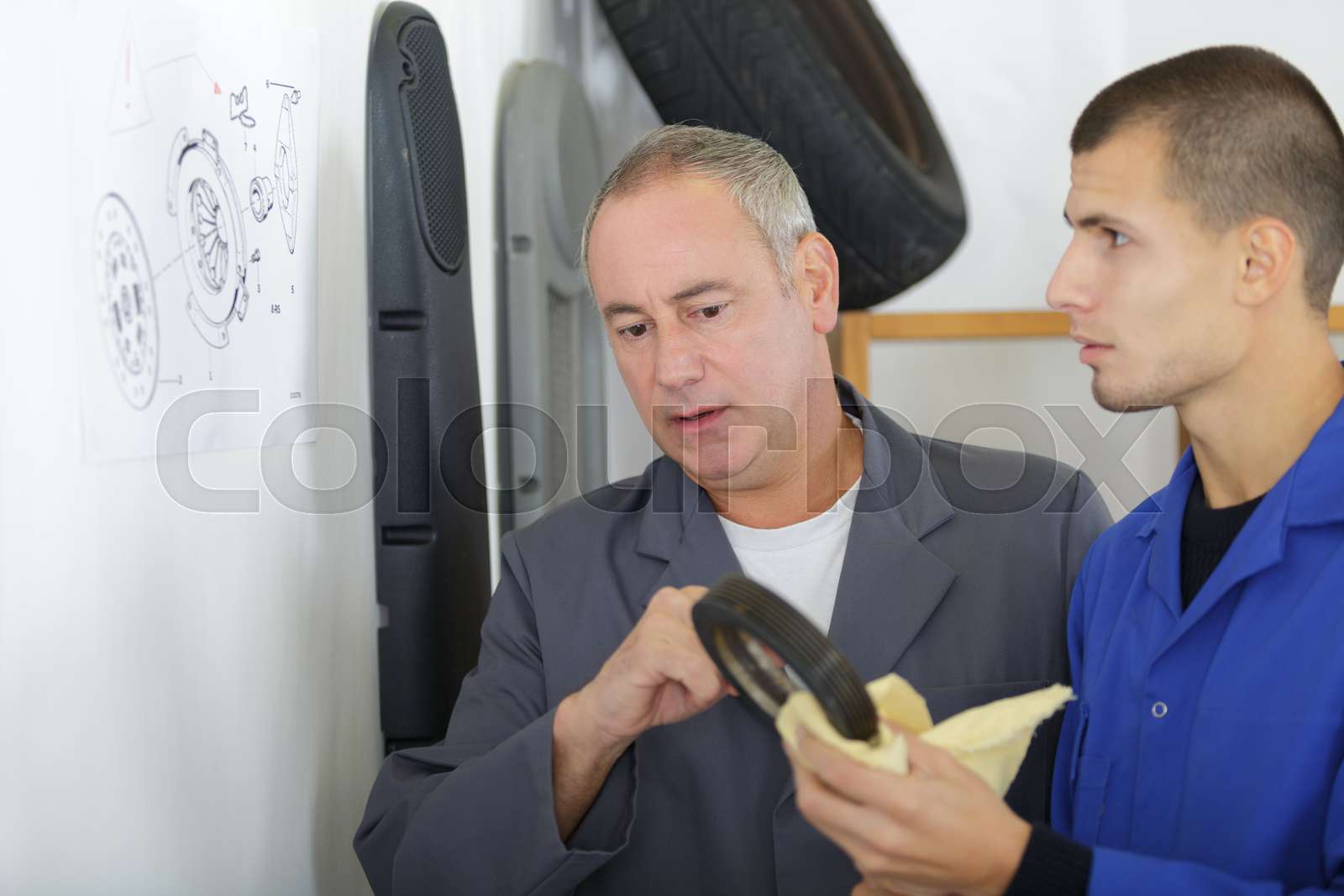 mechanical engineer teacher with student | Stock image | Colourbox