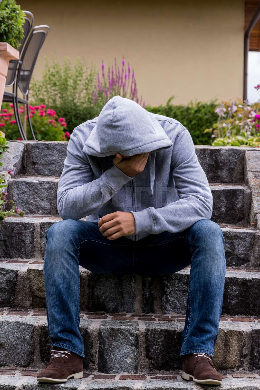 man is sitting on steps | Stock image | Colourbox