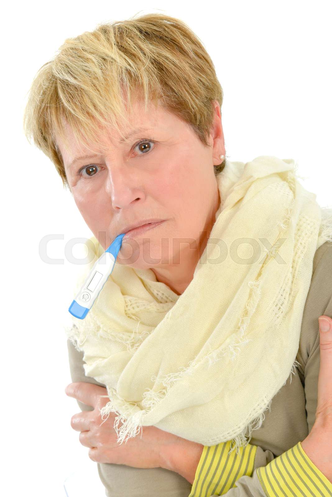 Elderly woman with a fever | Stock image | Colourbox