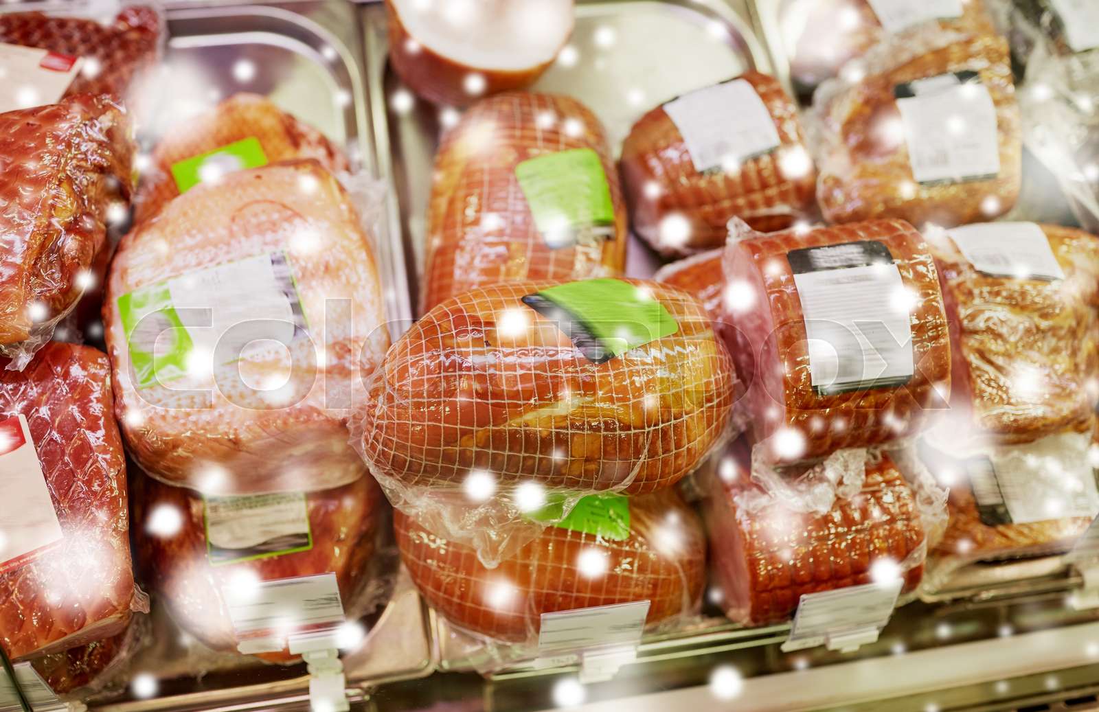 ham at grocery store stall | Stock image | Colourbox