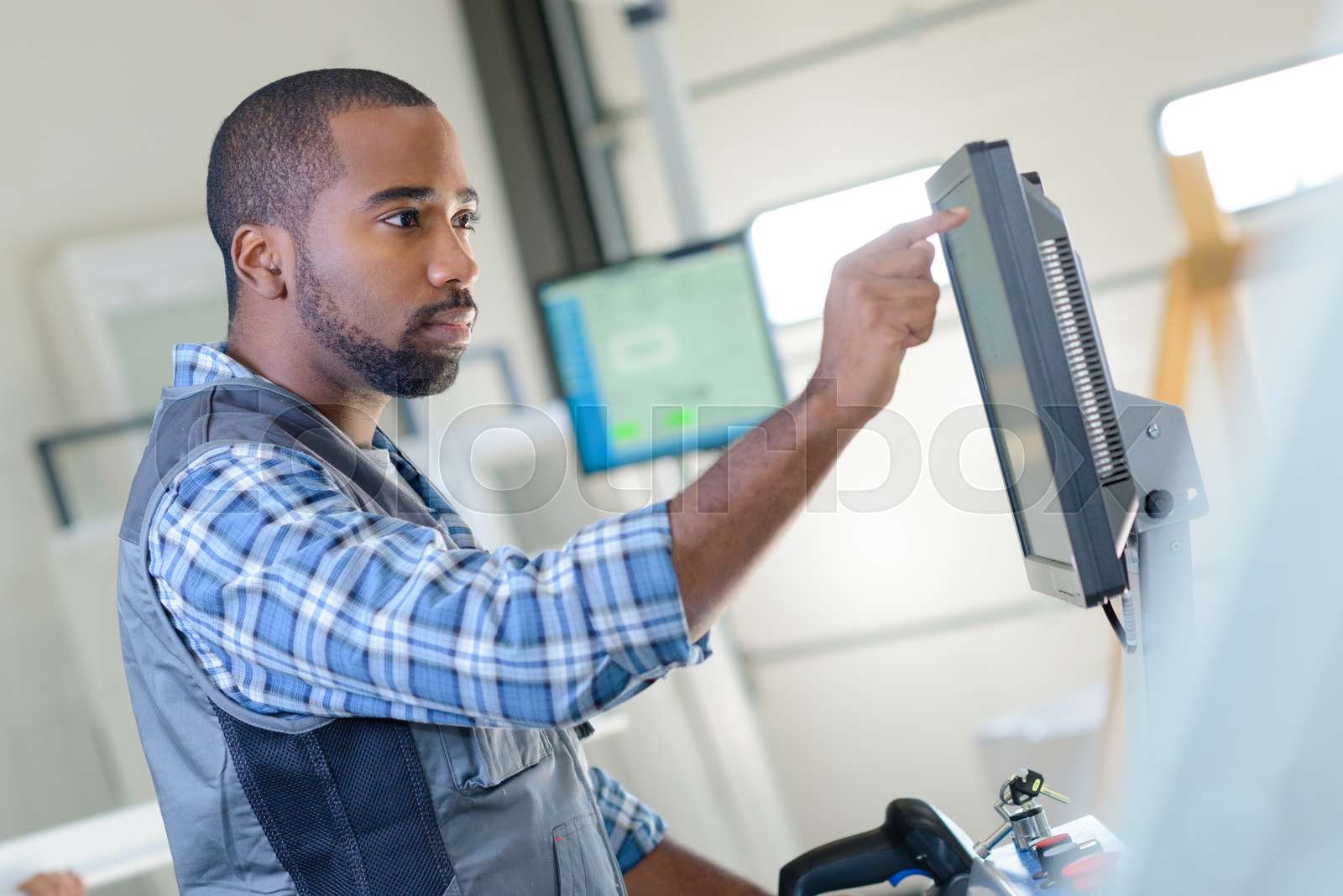 factory worker using computer | Stock image | Colourbox