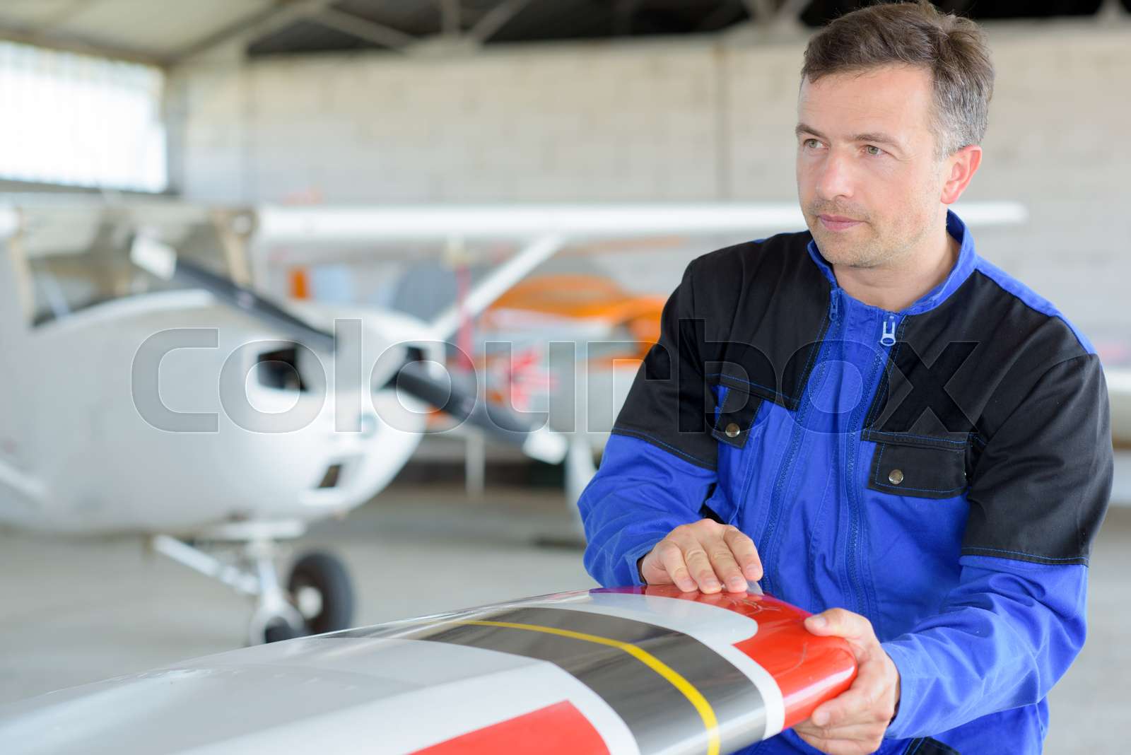 fixing a plane | Stock image | Colourbox