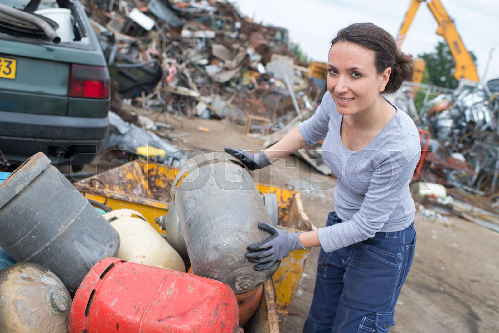 female worker at a scrap yard | Stock image | Colourbox