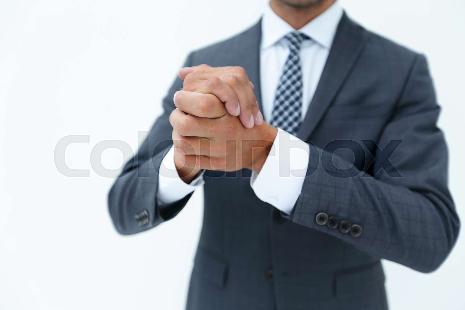 Close up on male clenched hands. | Stock image | Colourbox