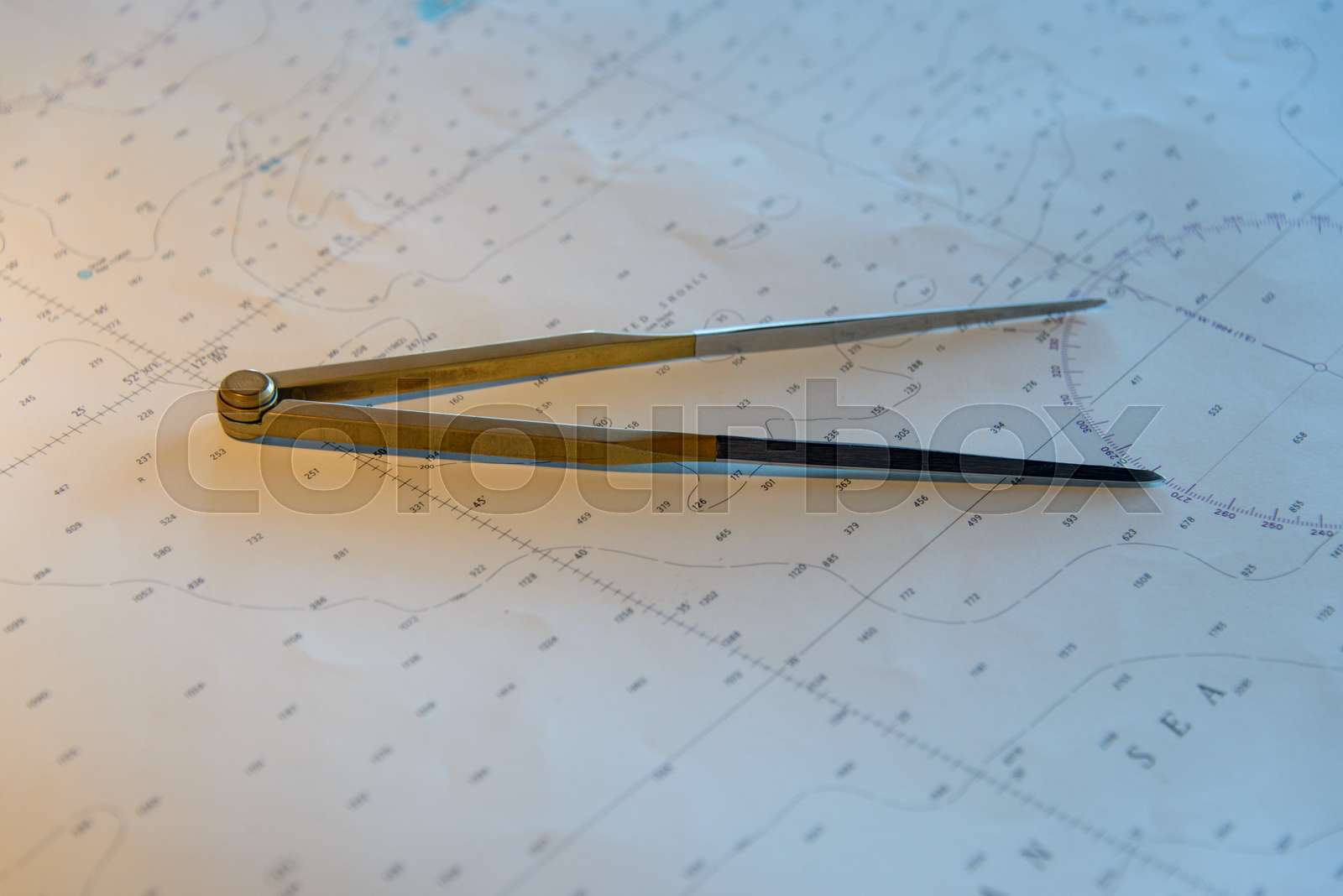 Map and navigational equipment, dividers | Stock image | Colourbox