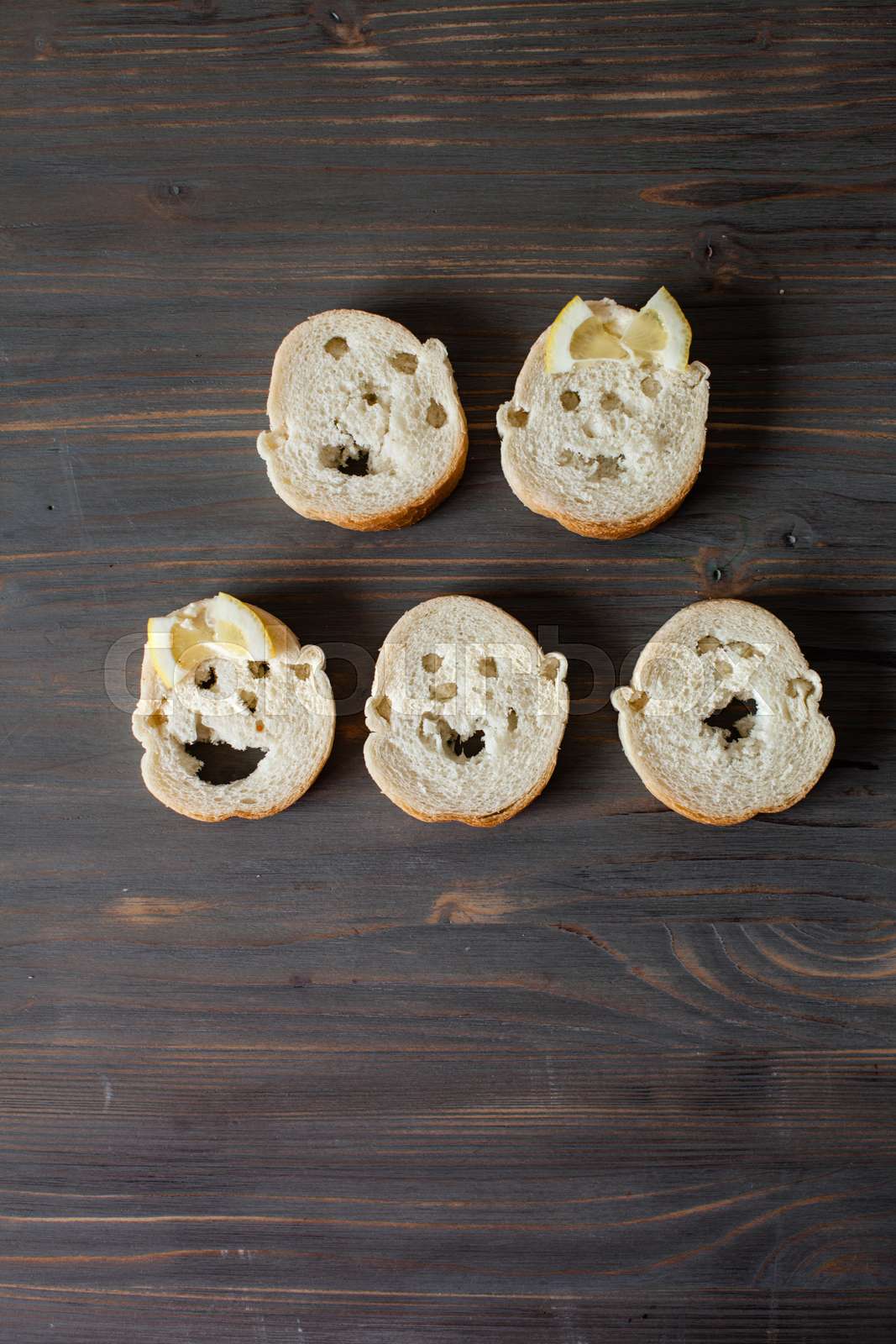 Faces from bread | Stock image | Colourbox