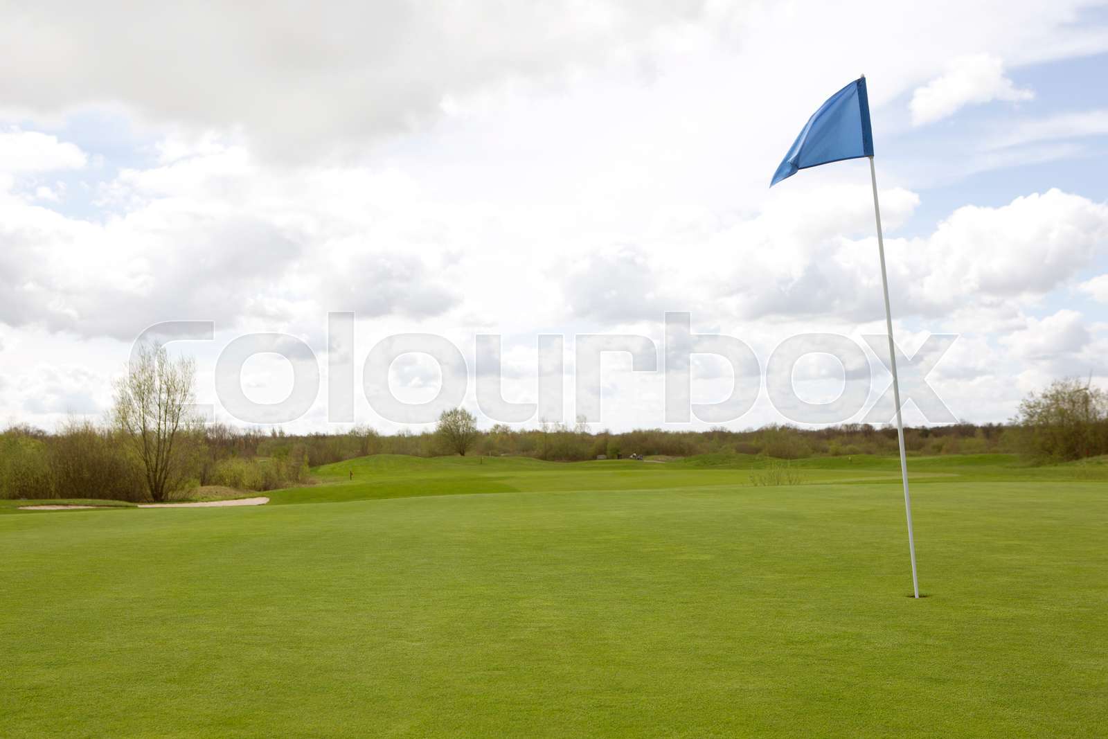Golf course flag | Stock image | Colourbox