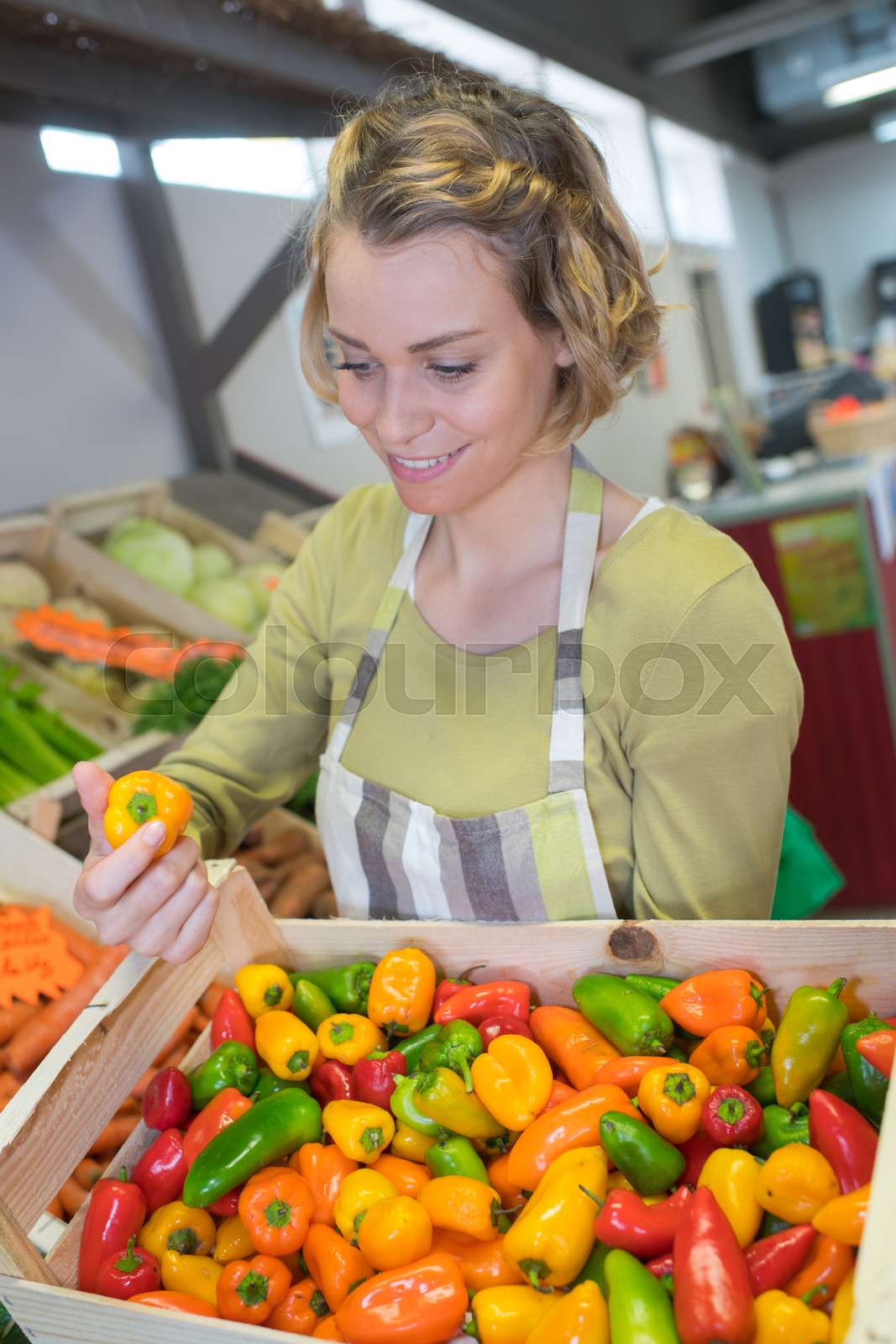 female worker at market | Stock image | Colourbox