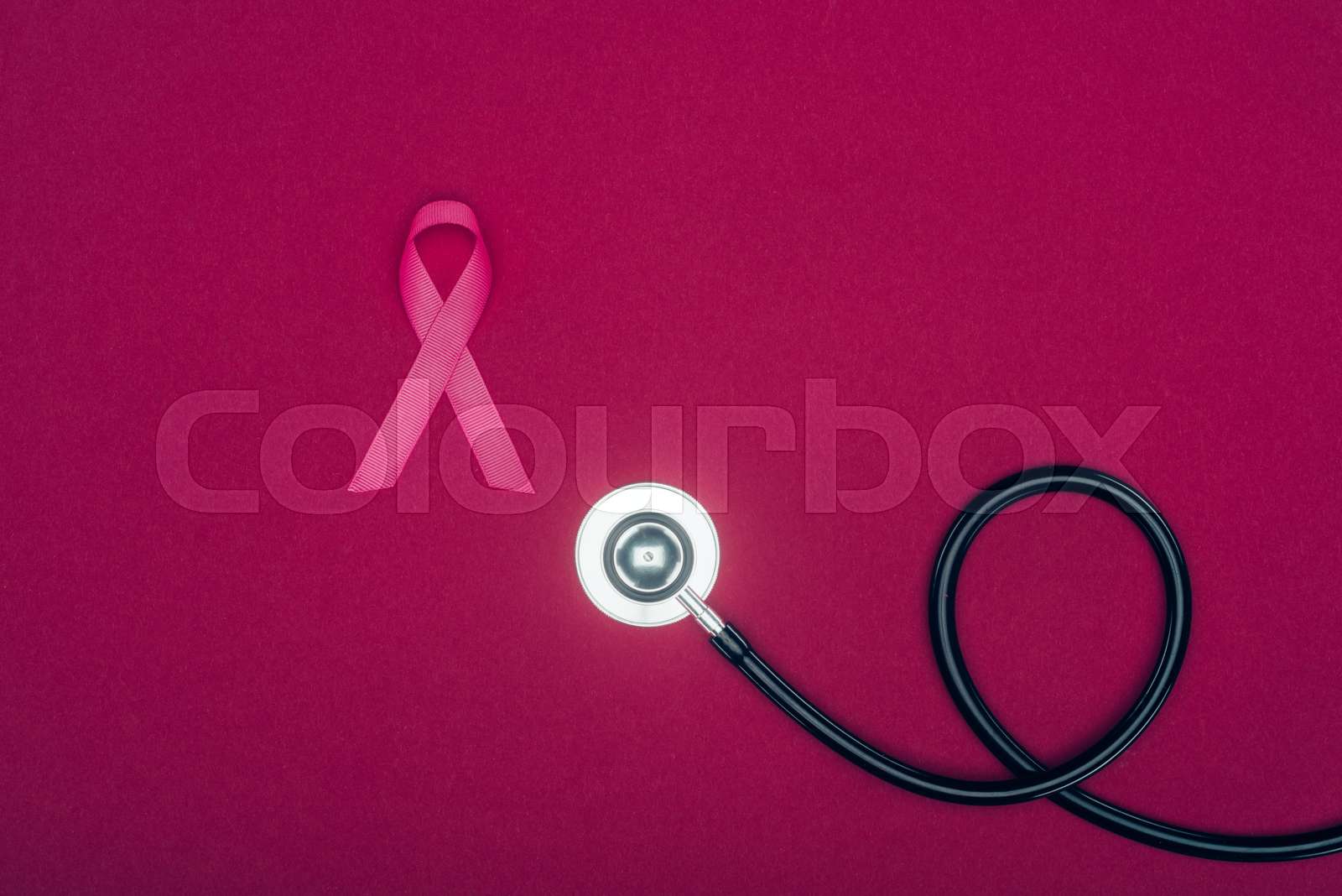 stethoscope and breast cancer ribbon | Stock image | Colourbox