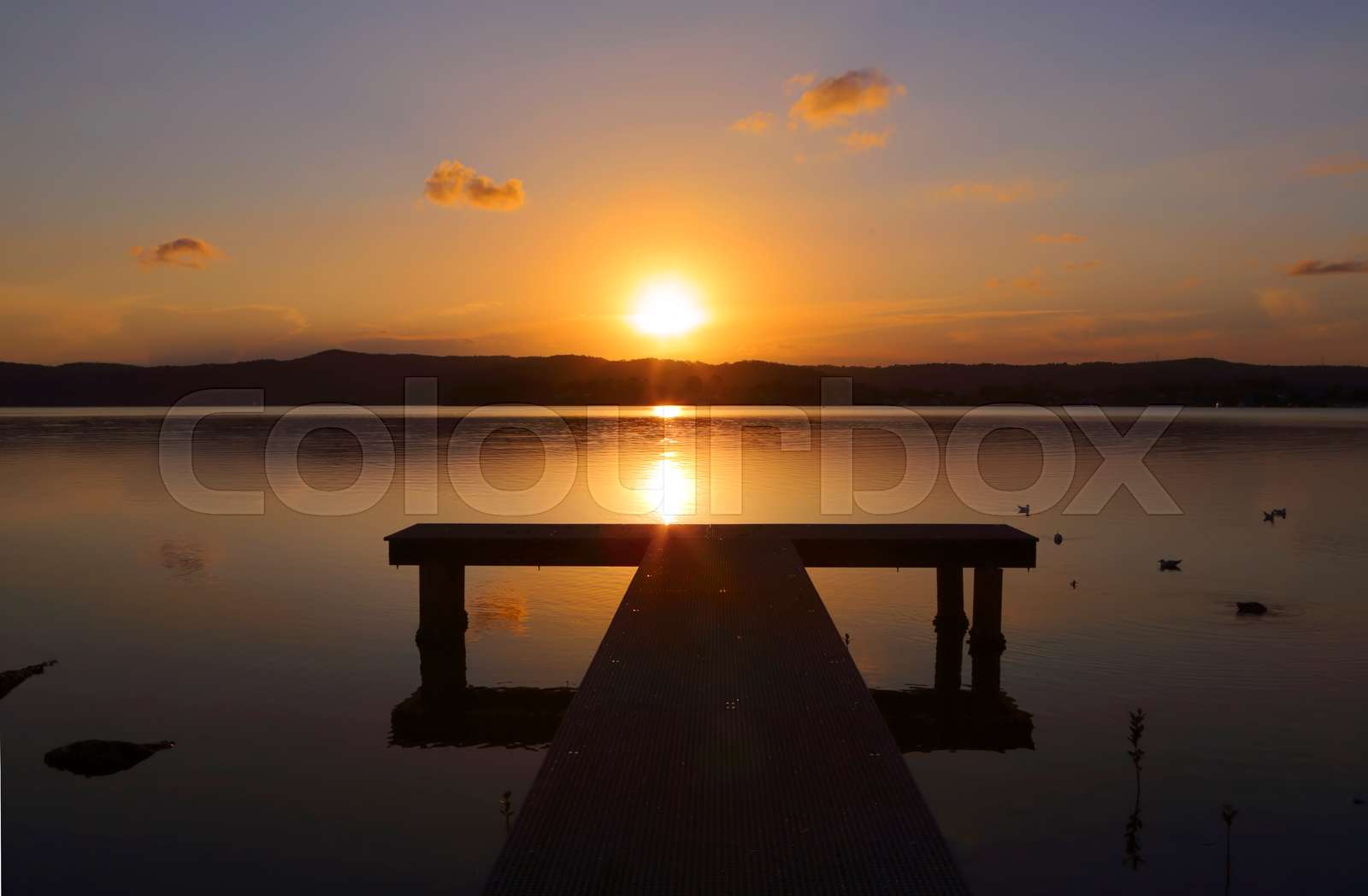 Sunset and jetty | Stock image | Colourbox