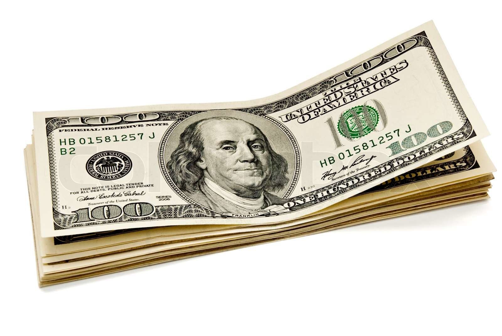 bundle of dollars isolated on white | Stock image | Colourbox