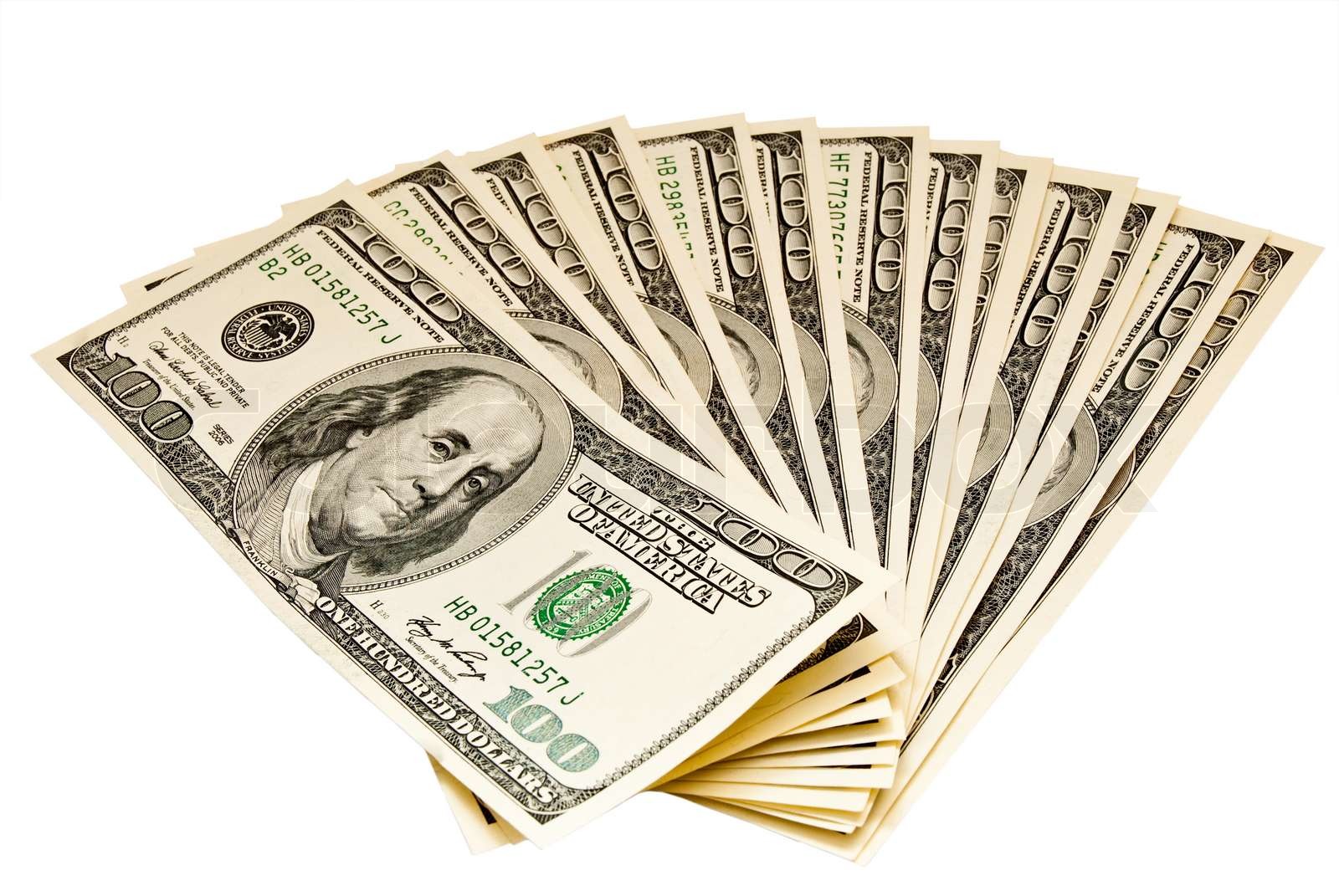 bundle of dollars isolated on white | Stock image | Colourbox