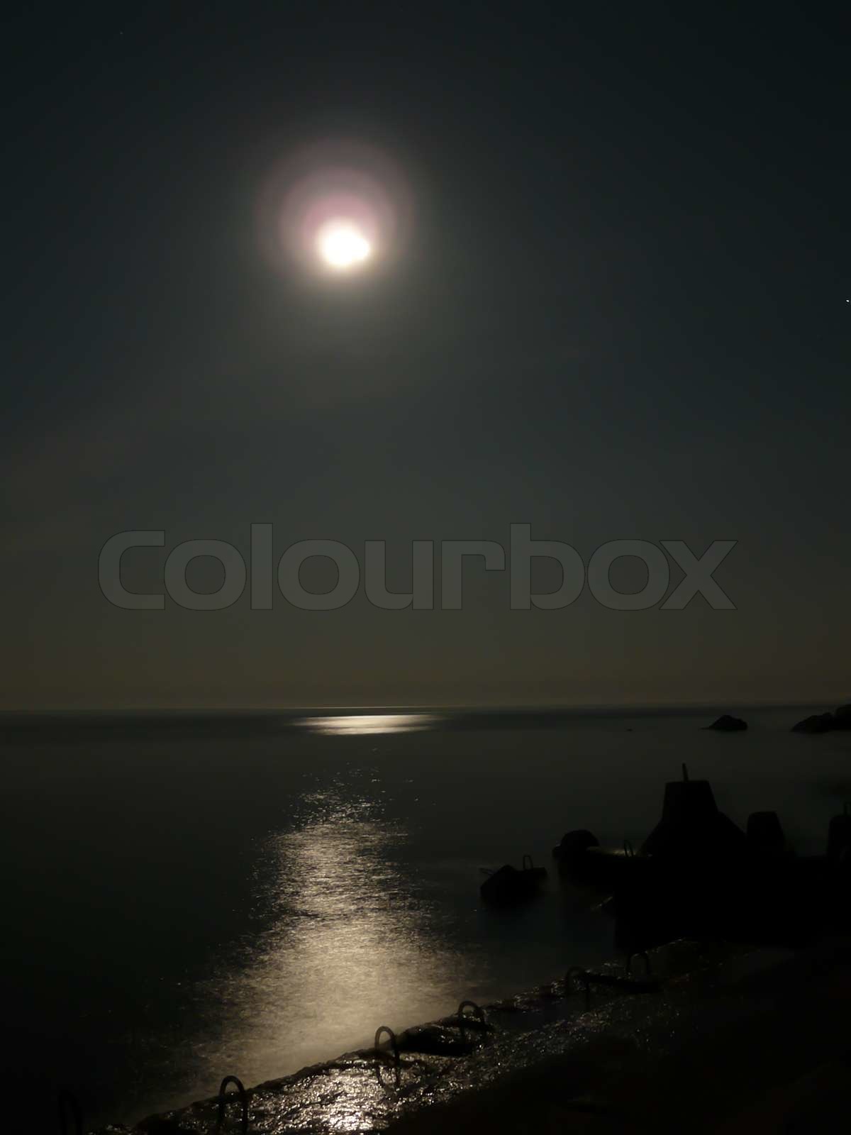 moon over the sea with reflections in the water | Stock image | Colourbox