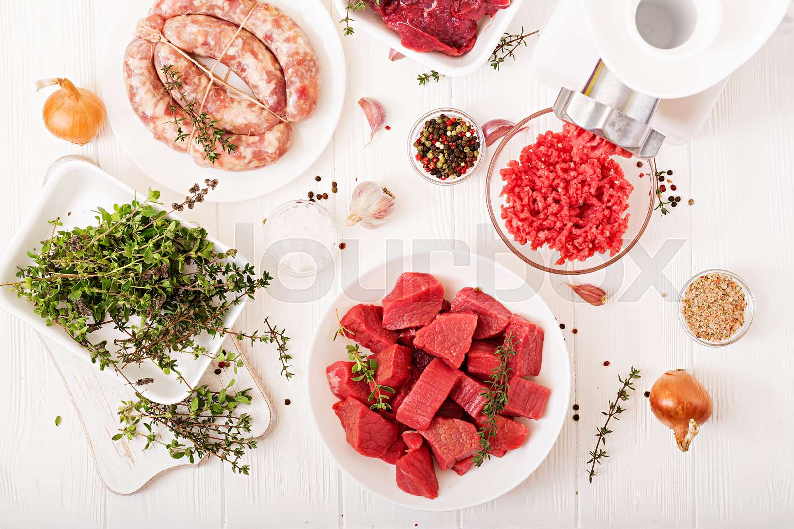 Chopped raw meat. The process of preparing forcemeat by means of a meat ...