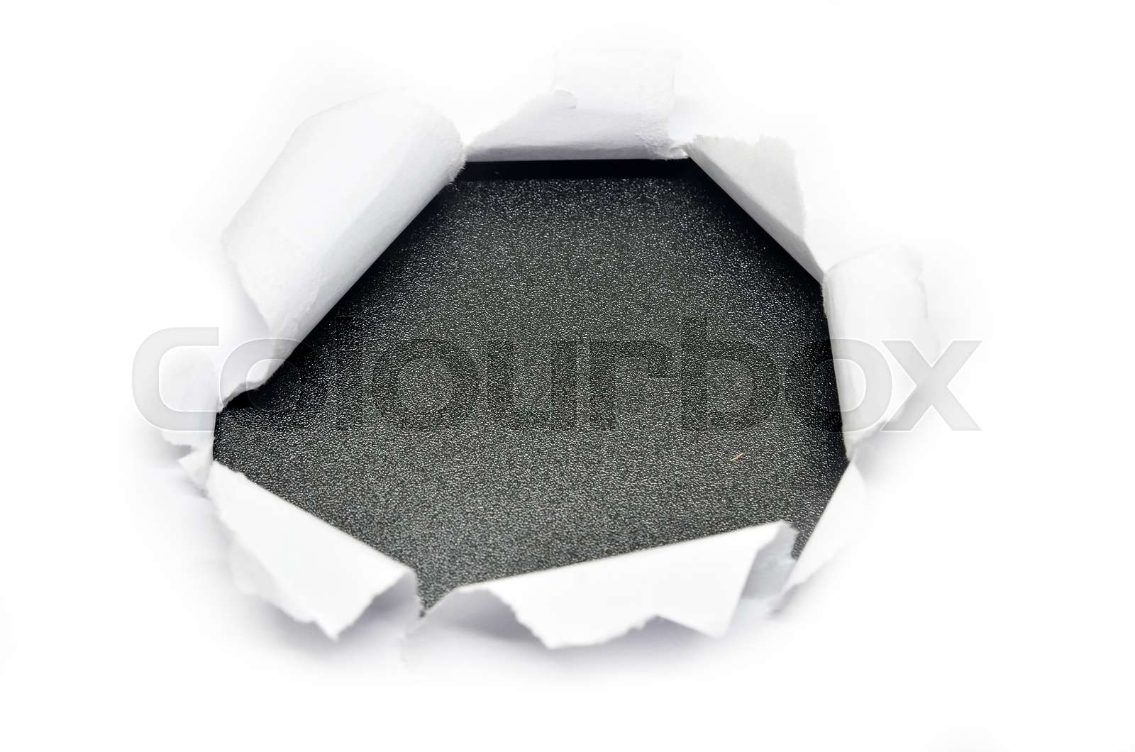 Hole in the paper with torn side | Stock image | Colourbox