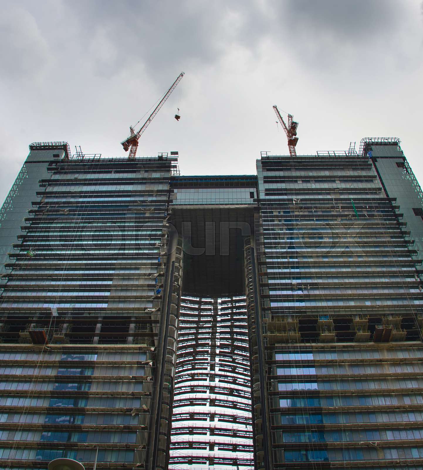 Construction of twin skyscraper, vertical | Stock image | Colourbox