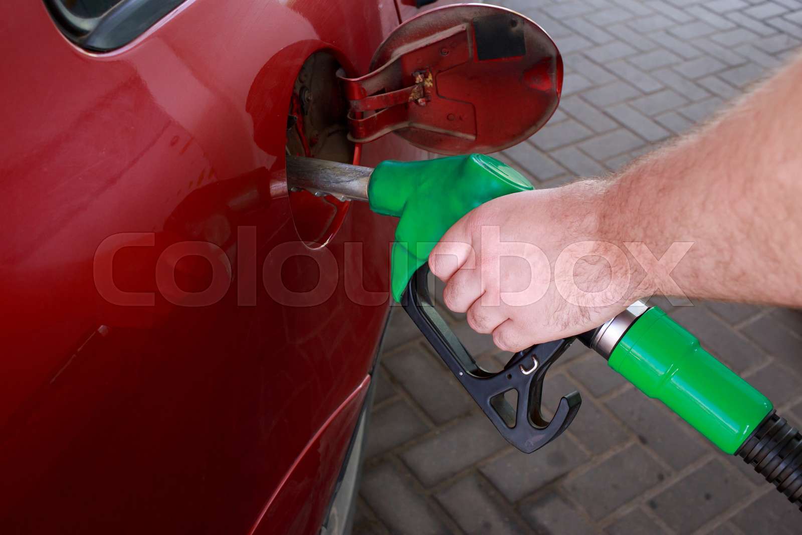 car fill with gasoline | Stock image | Colourbox