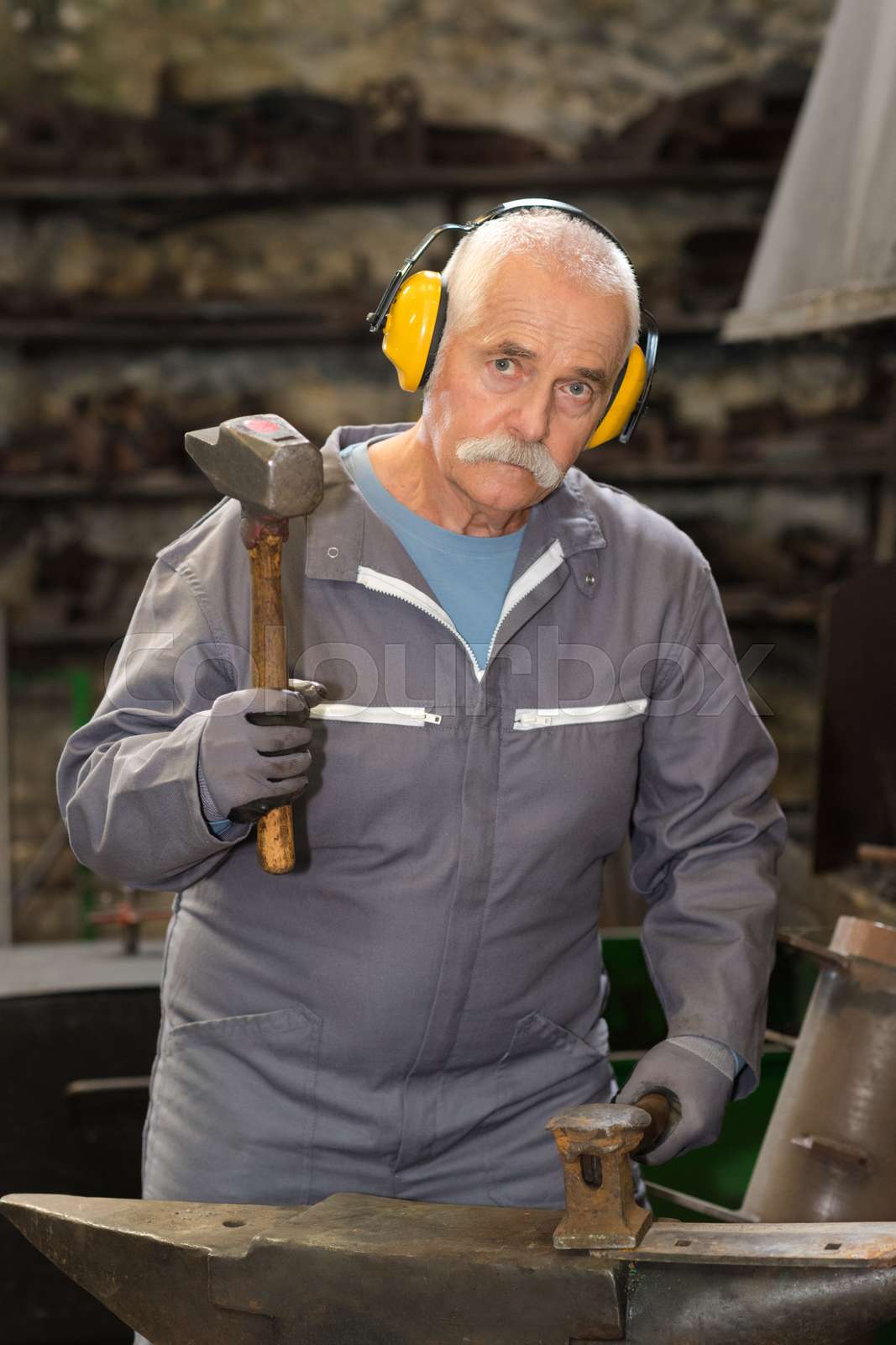 metal smith posing | Stock image | Colourbox