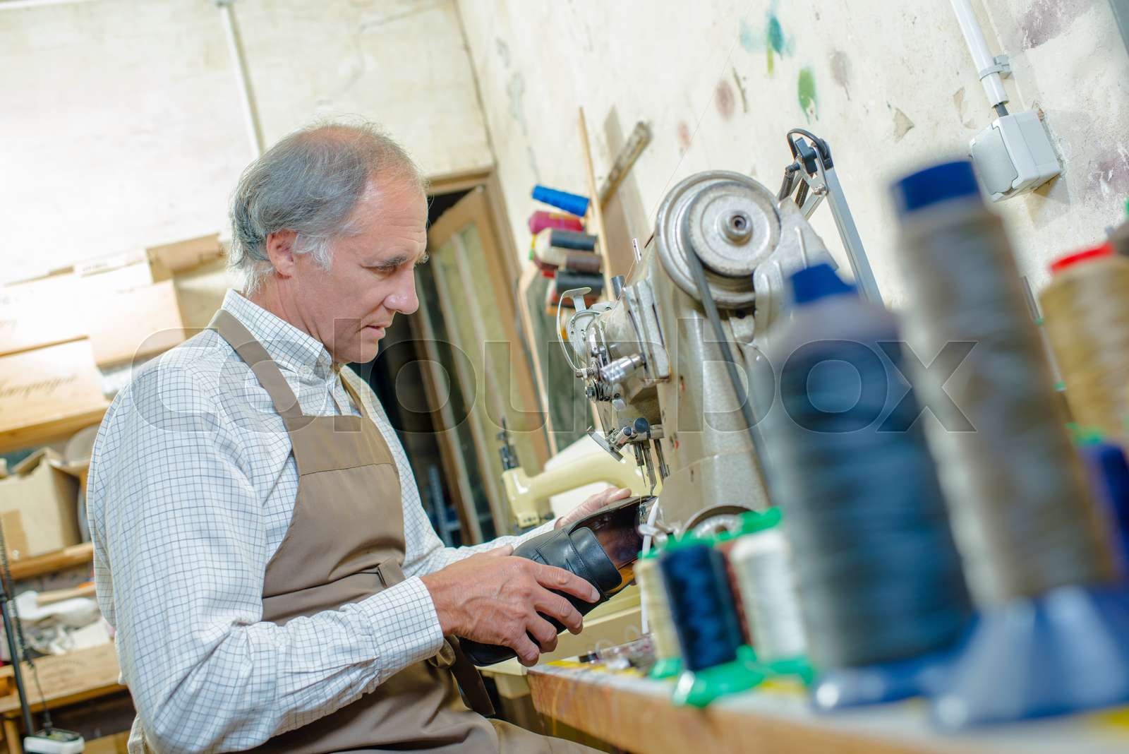 cobbler working | Stock image | Colourbox
