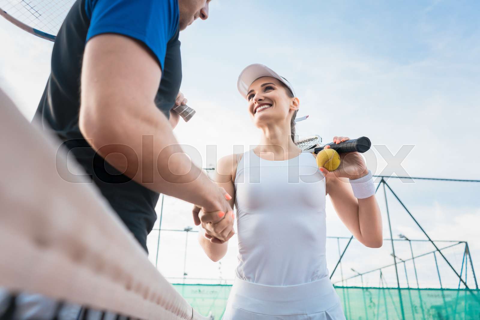 Tennis players shaking hand after match | Stock image | Colourbox
