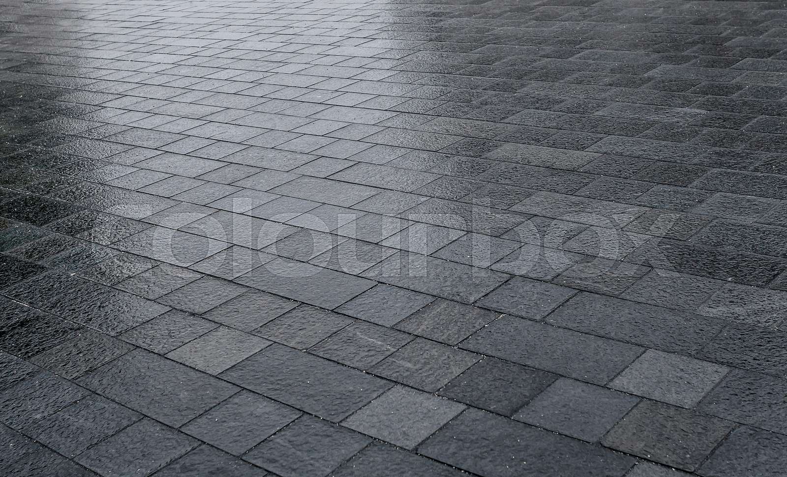 Wet paving stones. | Stock image | Colourbox