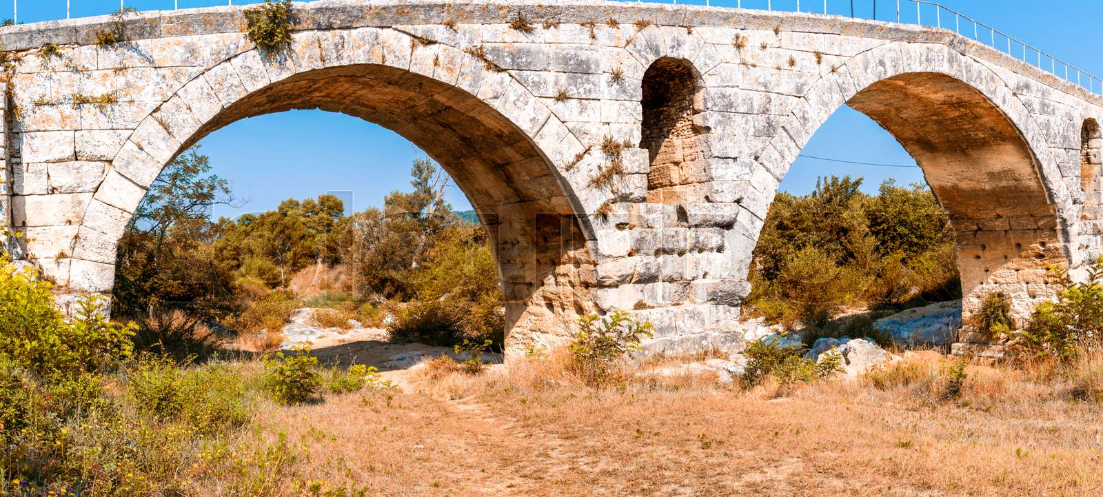 Panoramic view of Pont Julien, famous roman bridge in Bonnieux ...