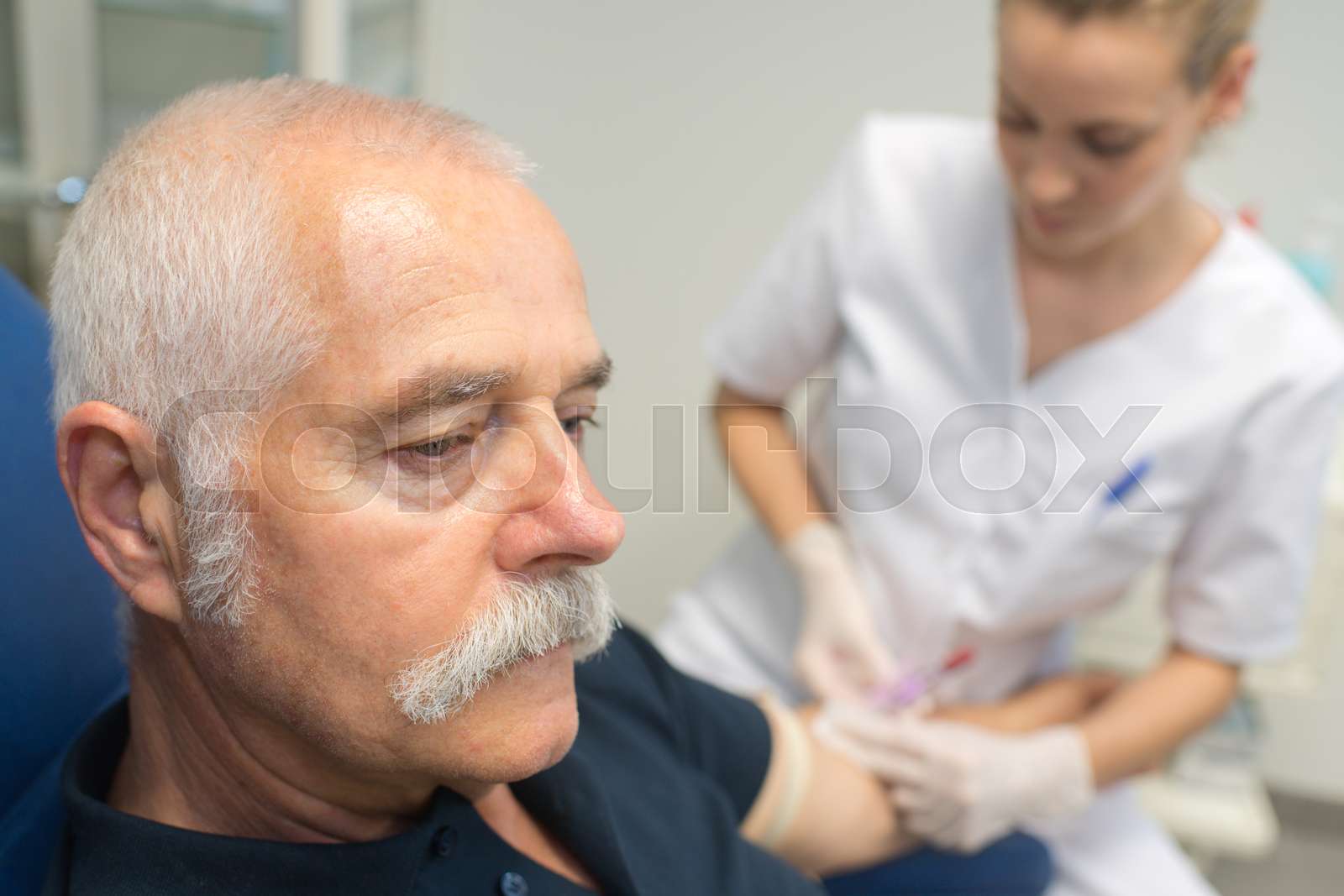 extracting the blood | Stock image | Colourbox