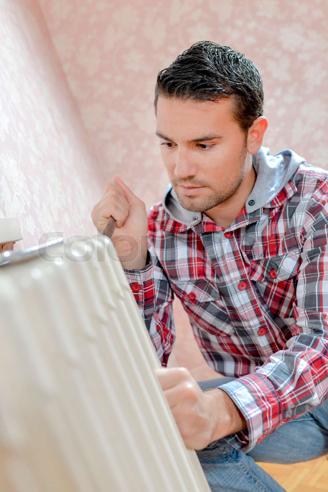 repairing-a-radiator-stock-image-colourbox